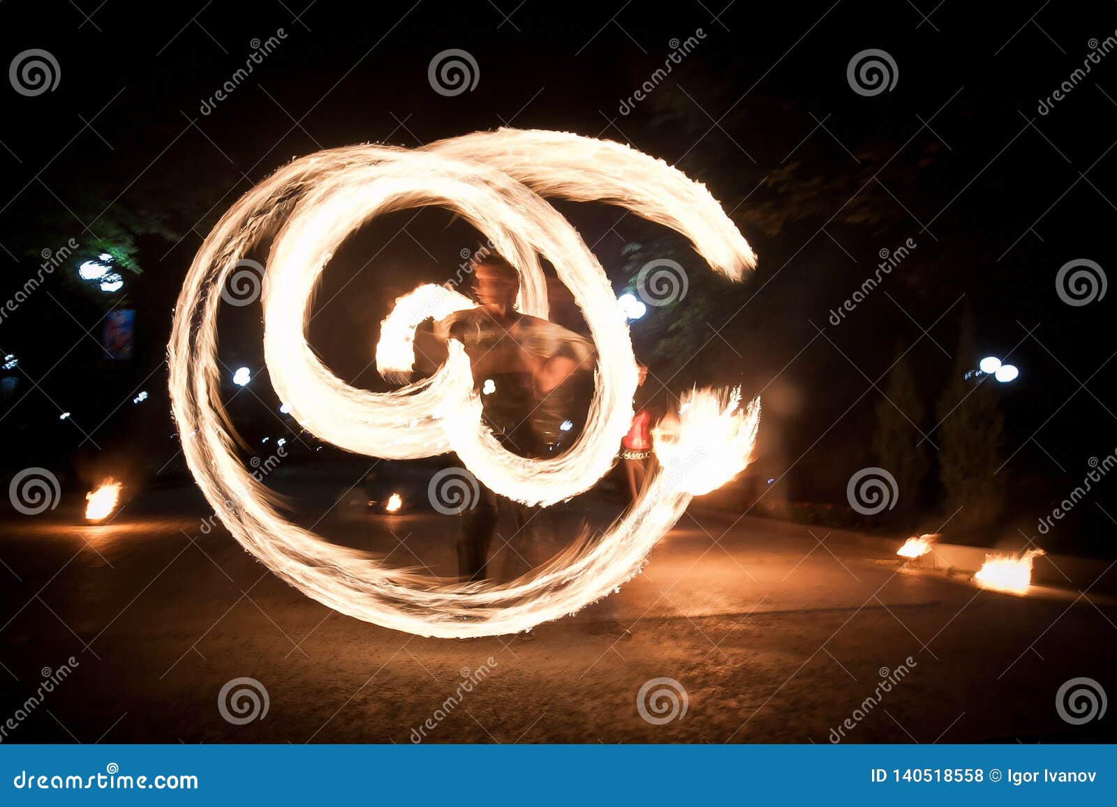 Amazing Fire Show Dance. Fire Dancer Playing with Flame Stock Photo ...