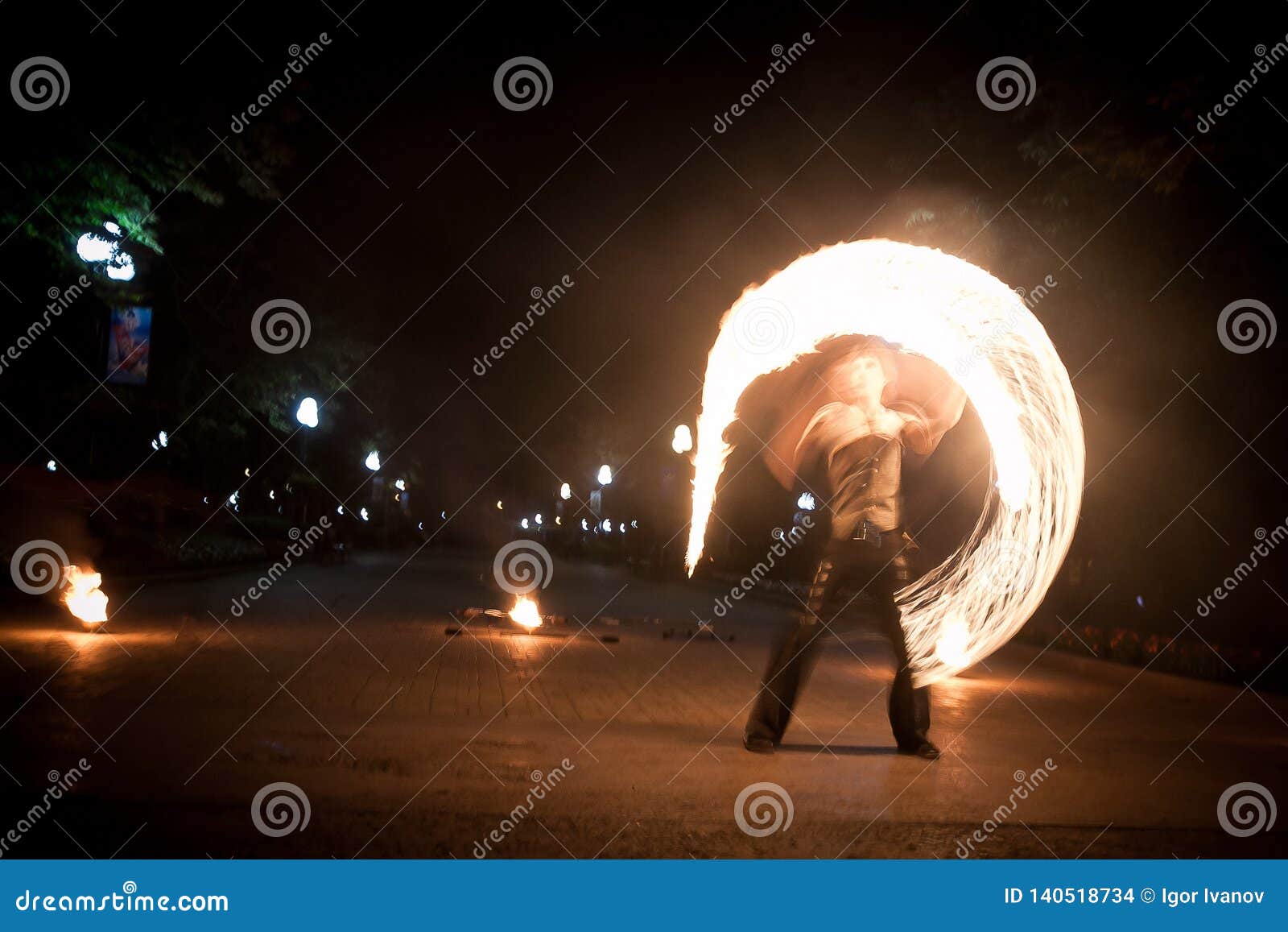 Amazing Fire Show Dance. Fire Dancer Playing with Flame Stock Photo ...