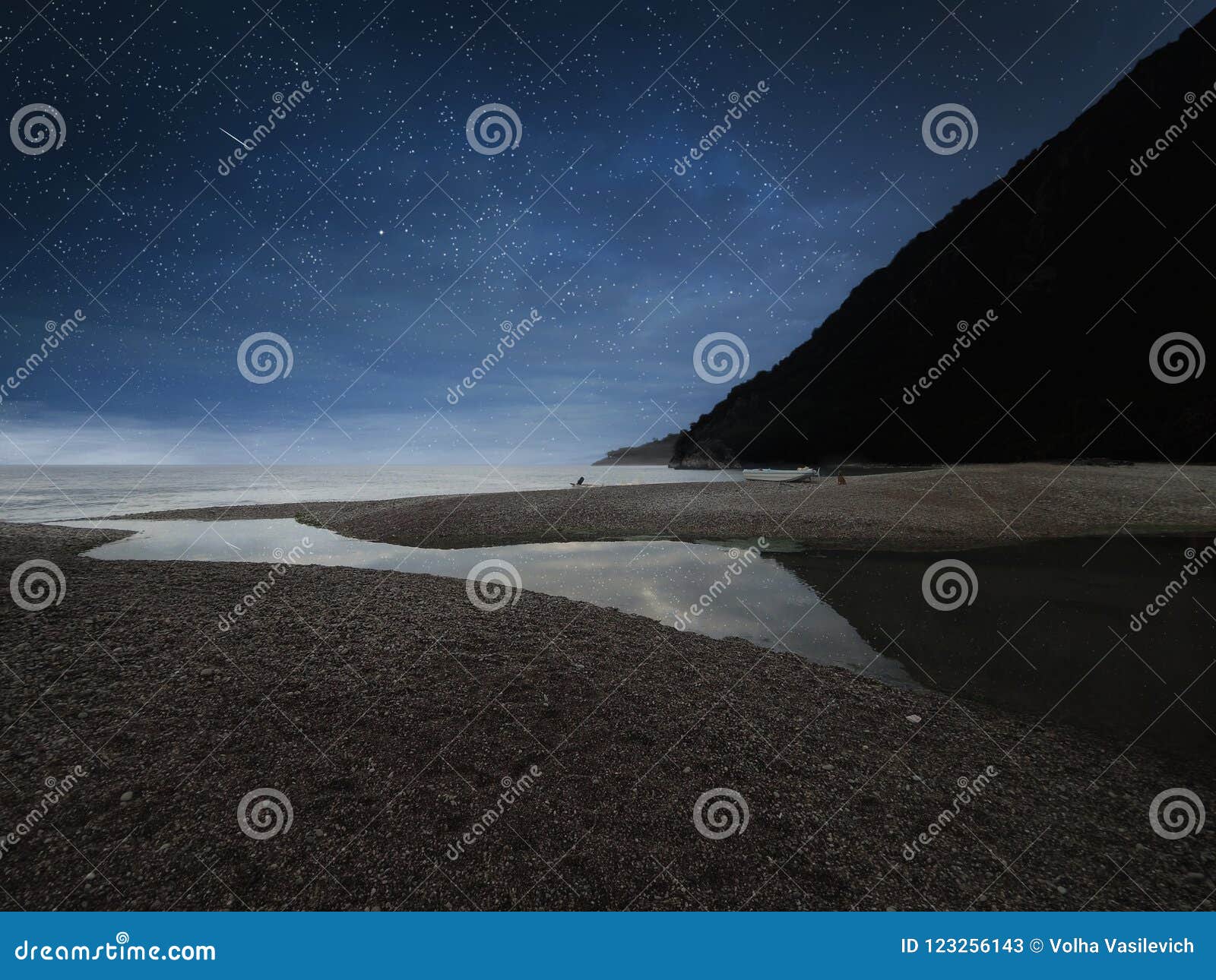 Amazing Landscape of Mountain Near the Sea with Stone Beach and Blue ... Amazing Landscape of Mountain Near the Sea with Stone Beach and Blue ...