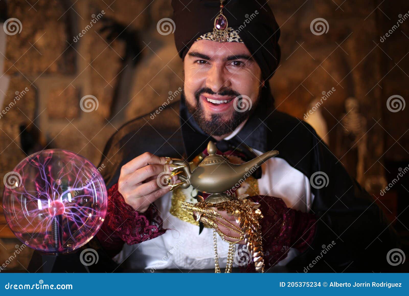 Amazing Man Holding Genie Lamp Stock Photo - Image of ethnic, ball ...