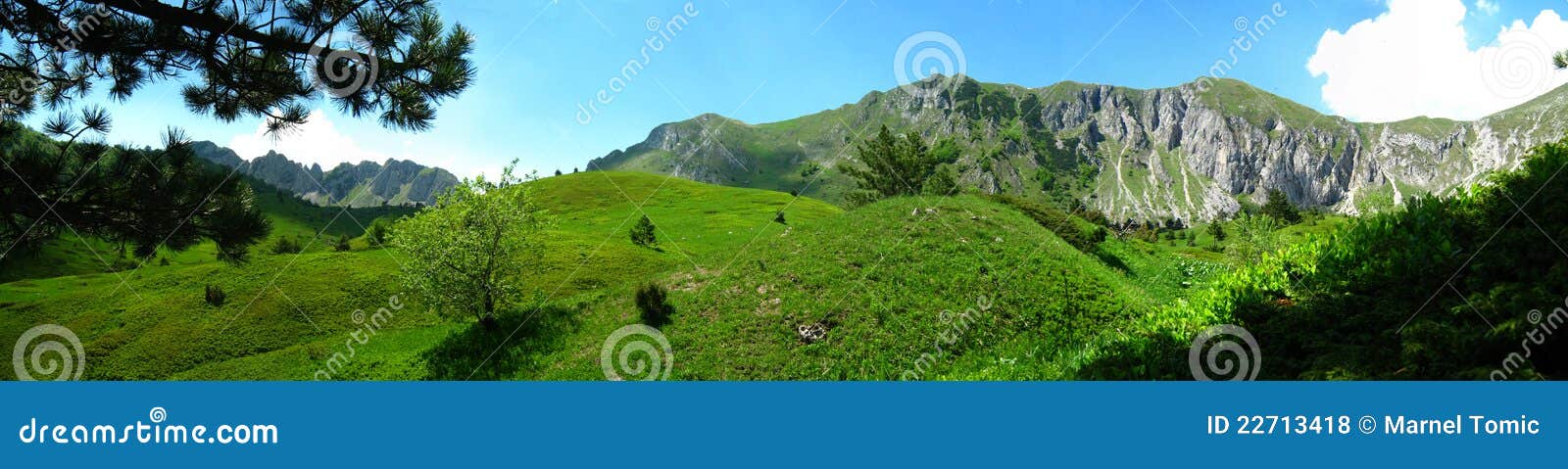 Amazing meadow and summit stock photo. Image of field - 22713418