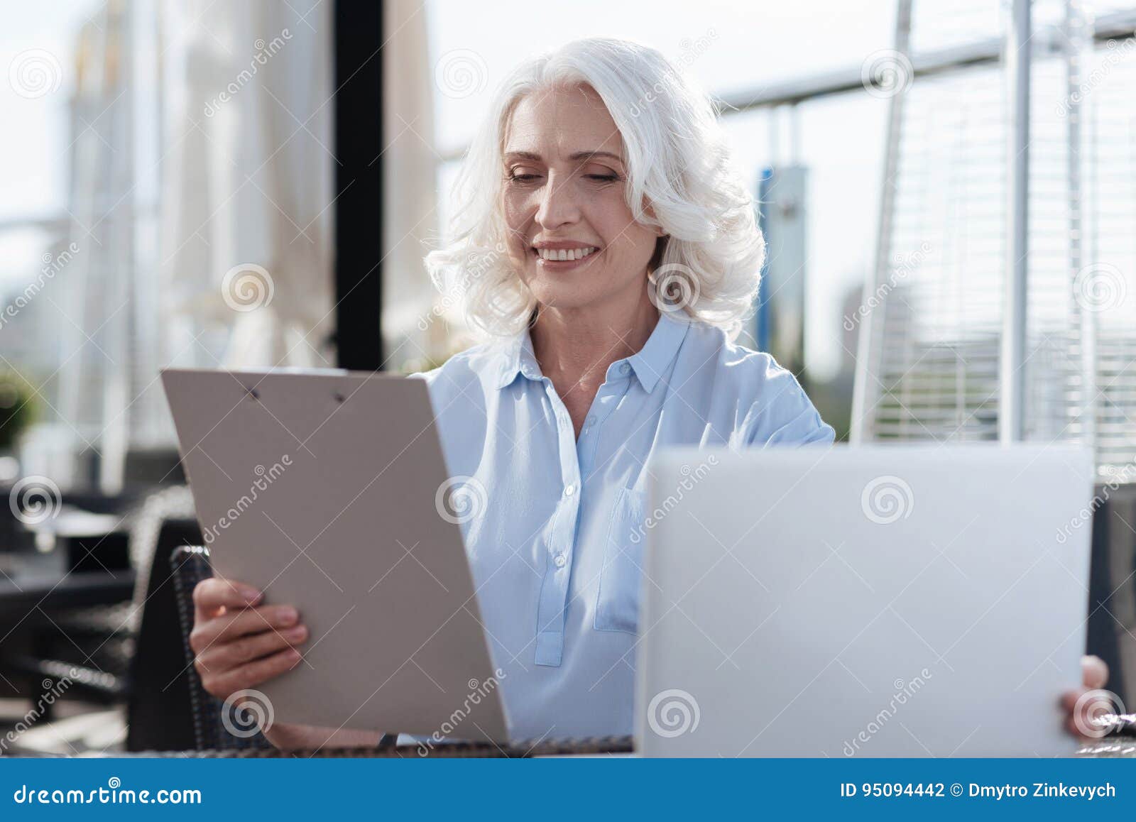 Amazing Office Worker Looking at Folder Stock Photo - Image of laptop ...