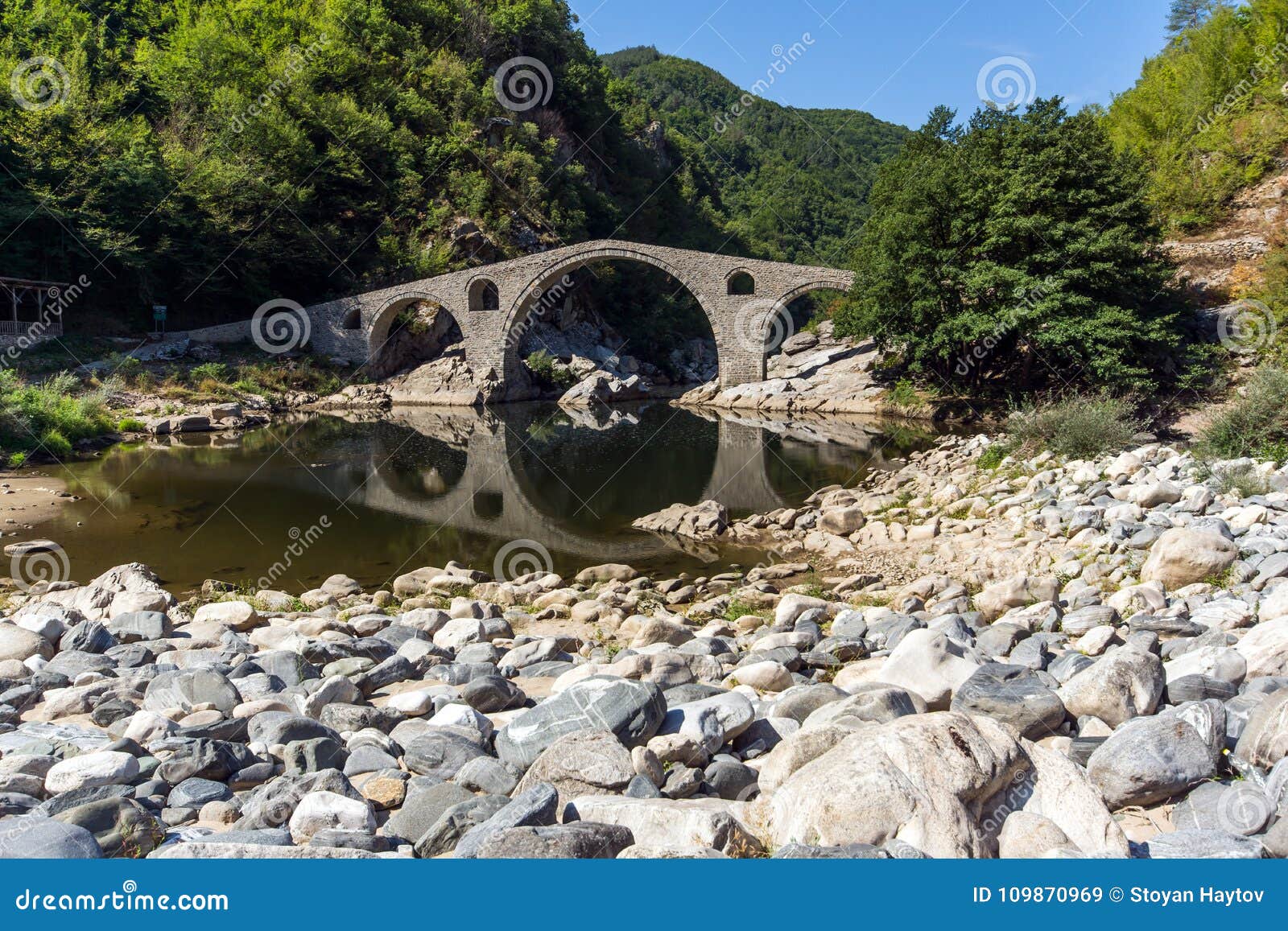 Amazing Reflection of Devil`s Bridge in Arda River and Rhodopes Mountain, Bulgaria Stock Image ...