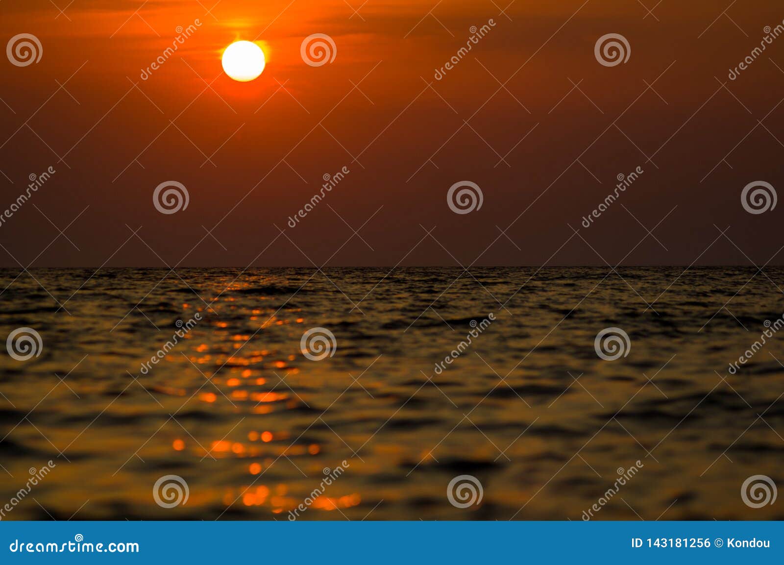 Amazing Sea Sunset on the Pebble Beach, the Sun, Waves, Clouds Stock ...