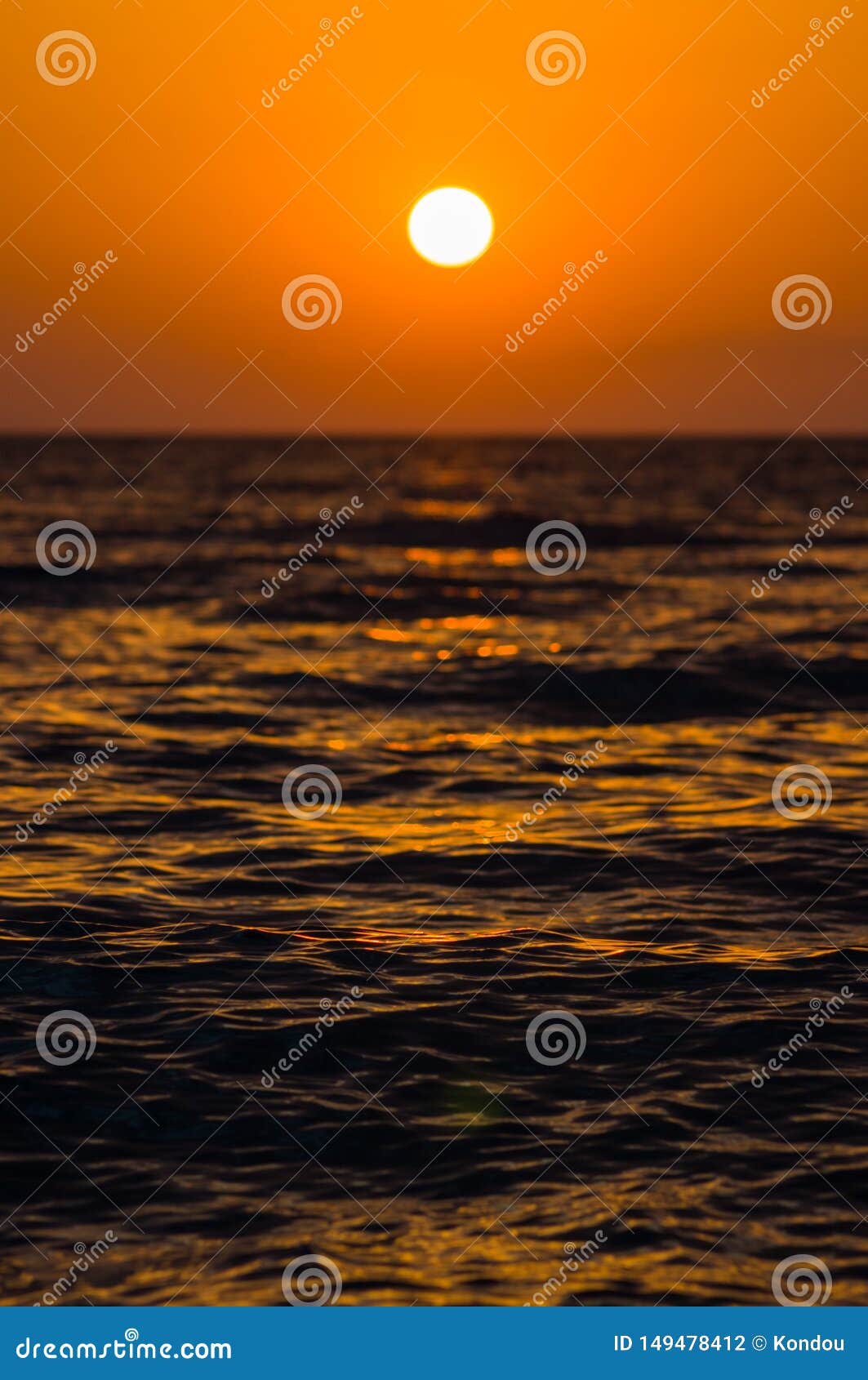 Amazing Sea Sunset on the Pebble Beach, the Sun, Waves, Clouds Stock ...