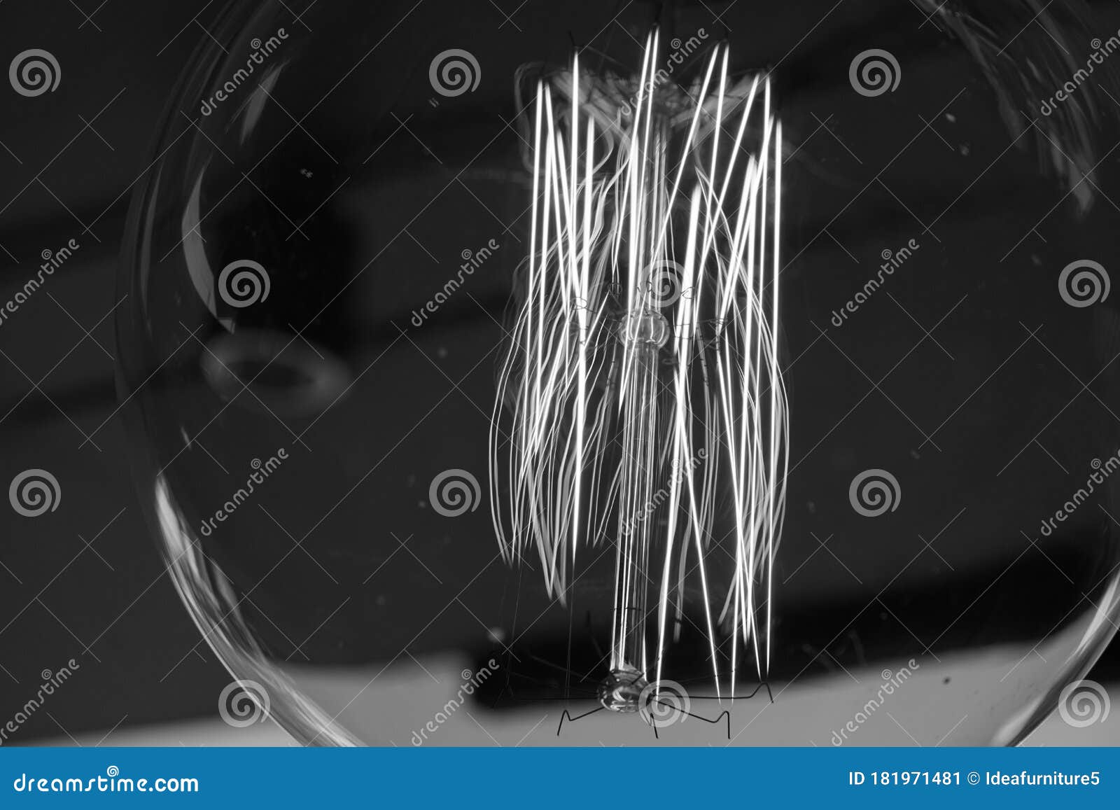 Electricity Current Inside a Retro Crystal Clear Light Bulb. Stock ...