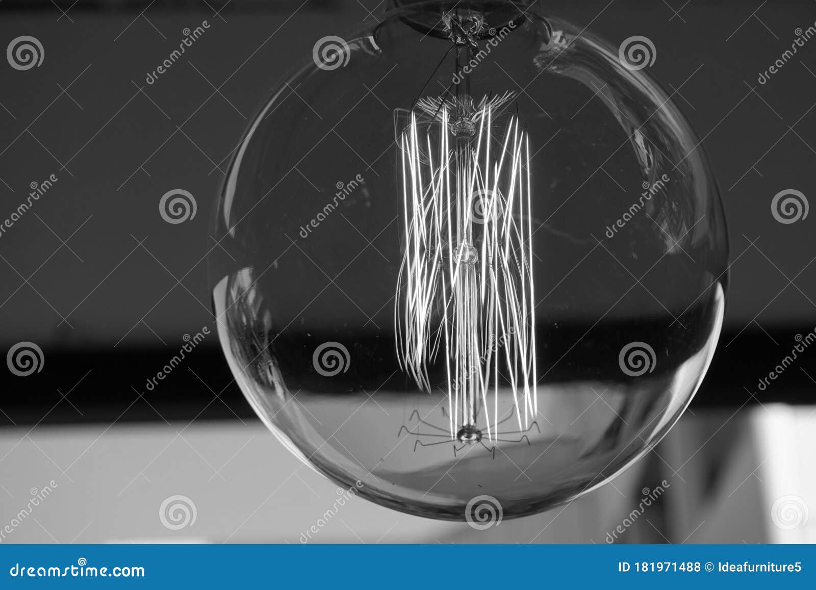 Electricity Current Inside a Retro Crystal Clear Light Bulb. Stock ...