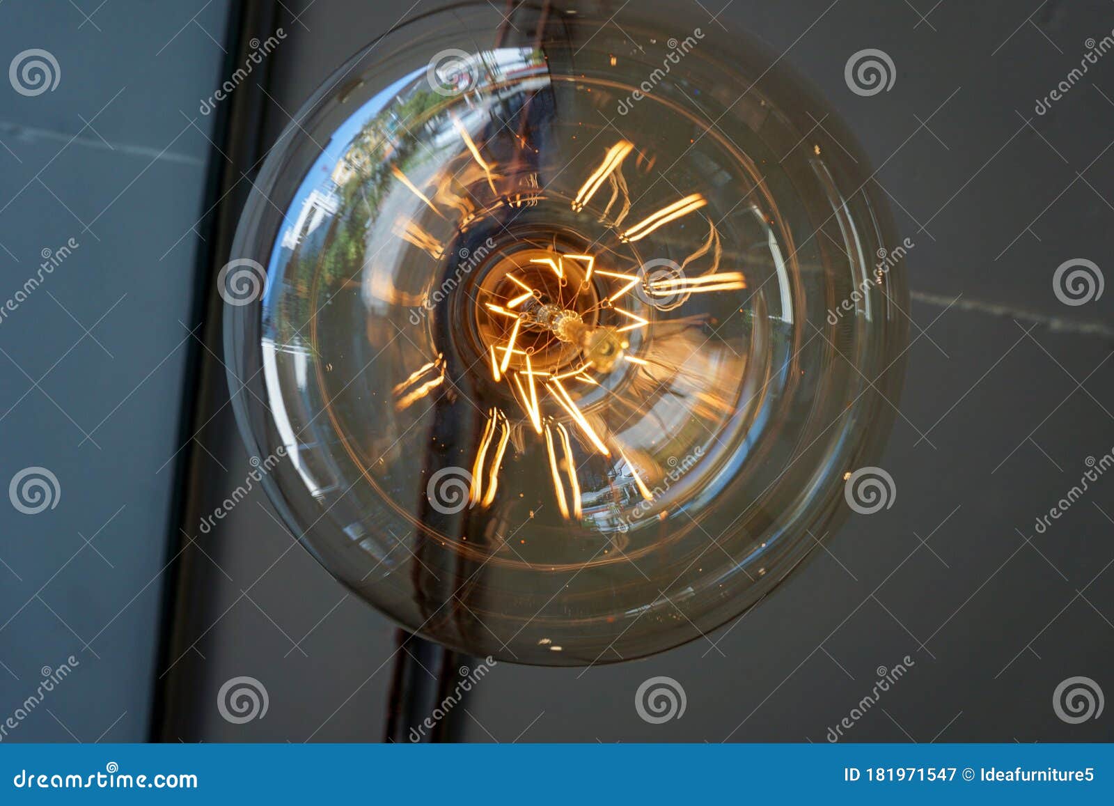 Electricity Current Inside a Retro Crystal Clear Light Bulb. Stock ...
