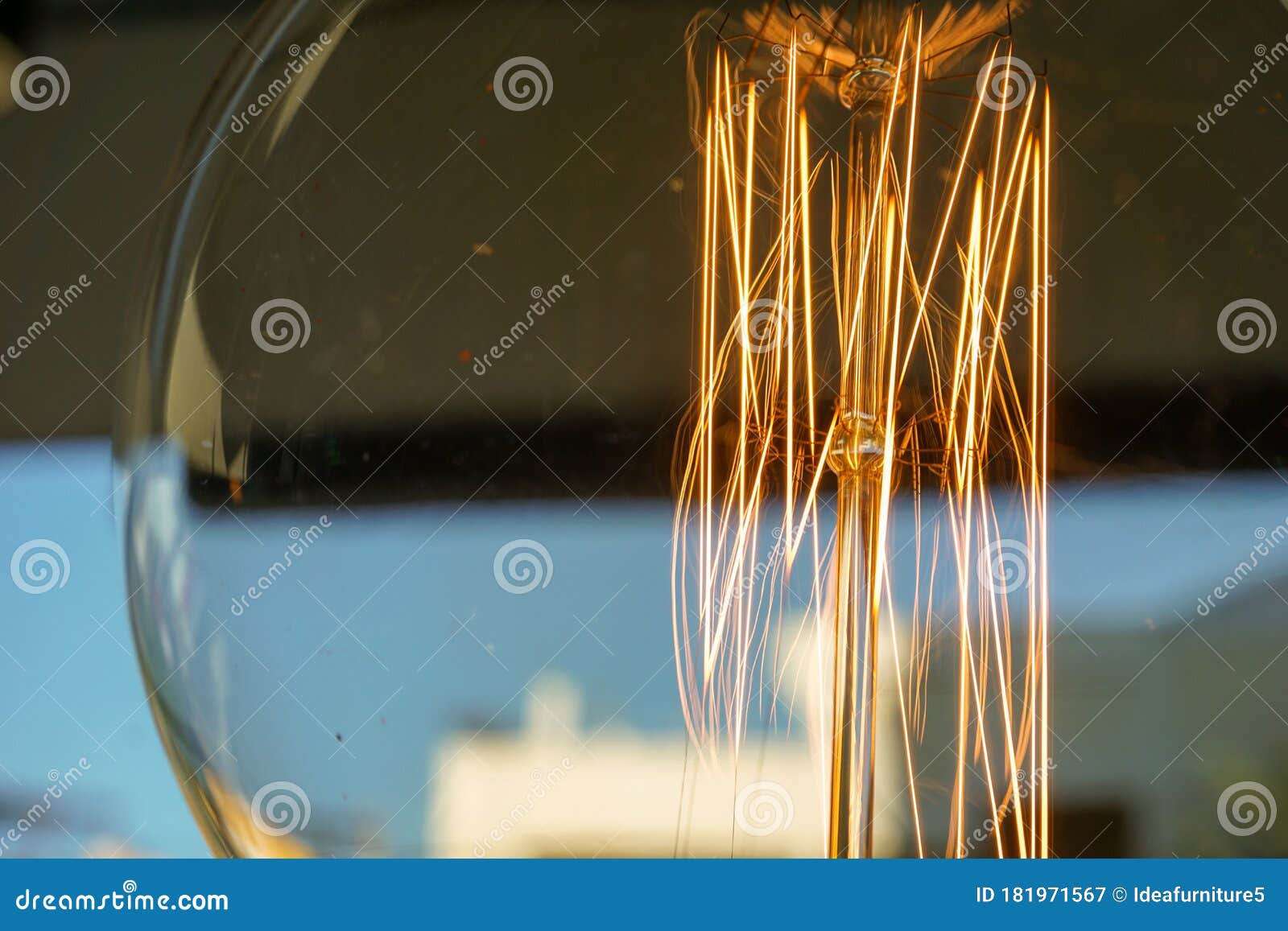 Electricity Current Inside a Retro Crystal Clear Light Bulb. Stock ...