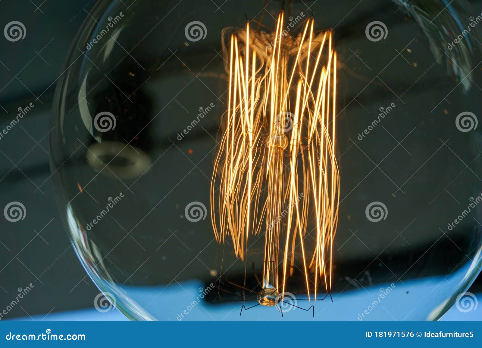 Electricity Current Inside a Retro Crystal Clear Light Bulb. Stock ...