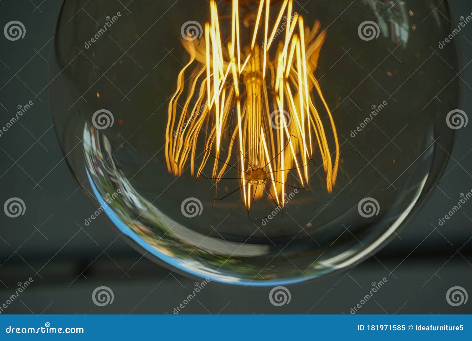 Electricity Current Inside a Retro Crystal Clear Light Bulb. Stock ...
