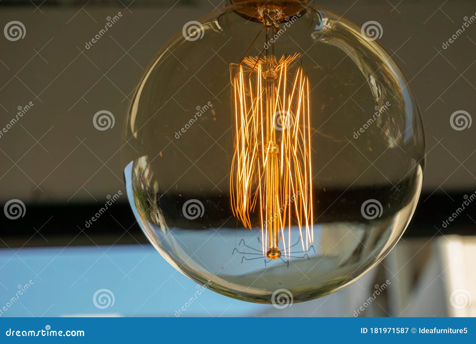 Electricity Current Inside a Retro Crystal Clear Light Bulb. Stock ...