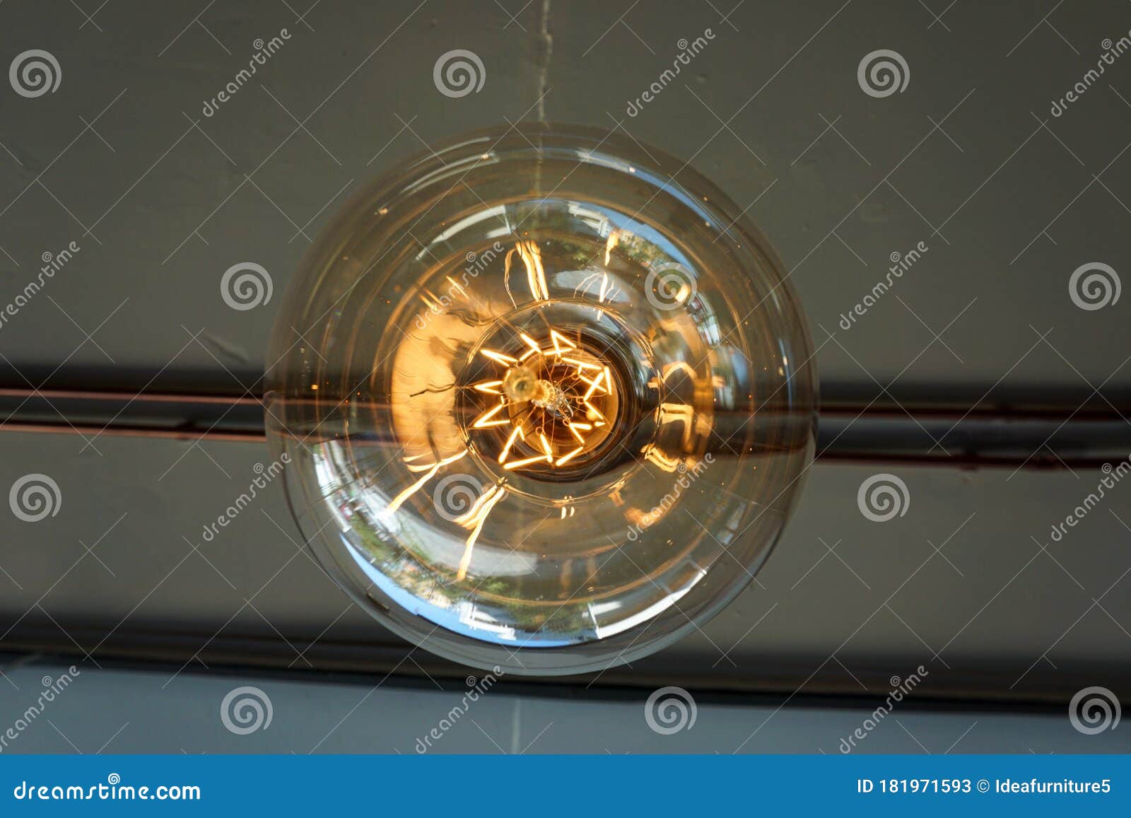 Electricity Current Inside a Retro Crystal Clear Light Bulb. Stock ...
