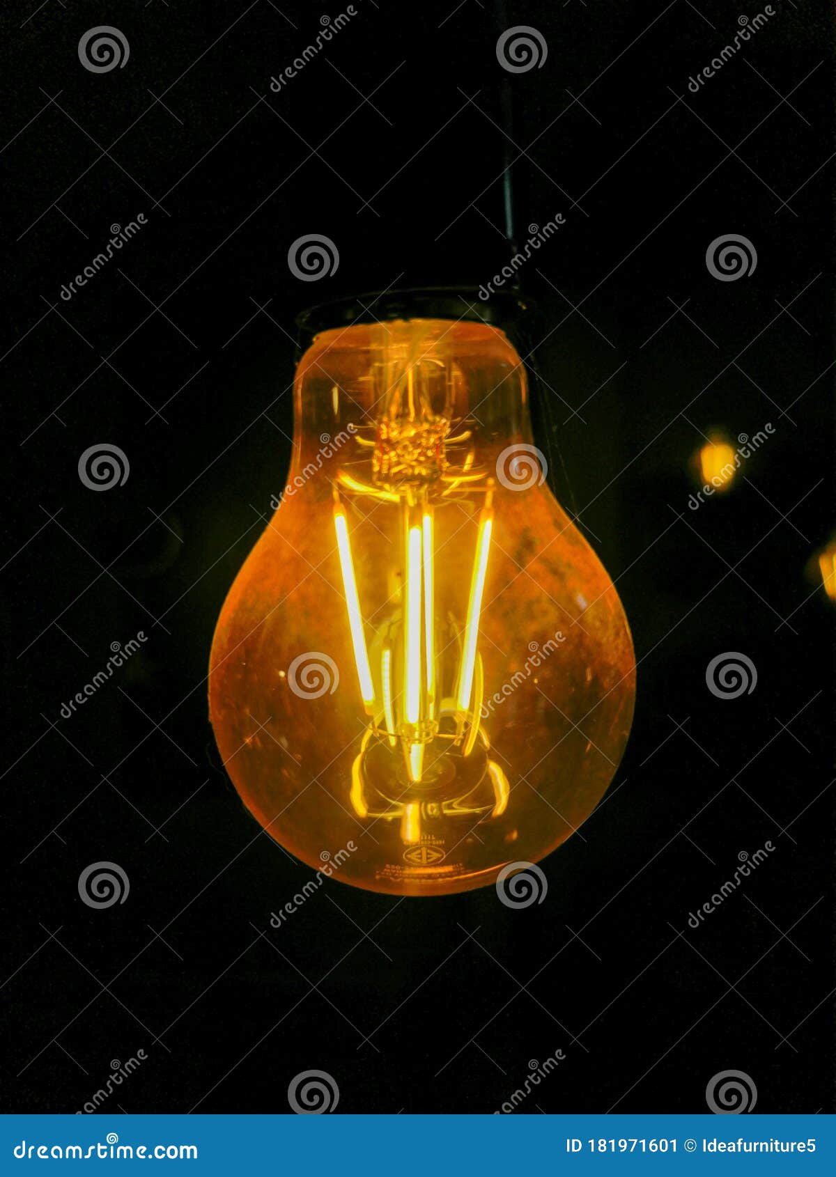 Electricity Current Inside a Retro Crystal Clear Light Bulb. Stock ...