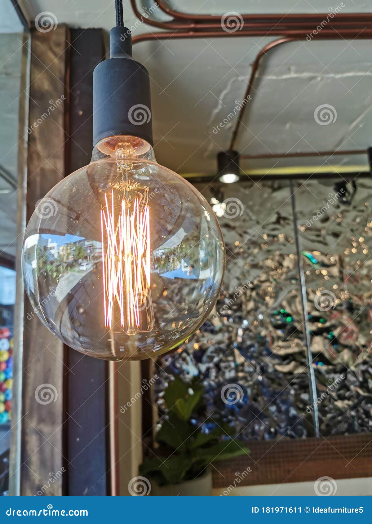 Electricity Current Inside a Retro Crystal Clear Light Bulb. Stock ...
