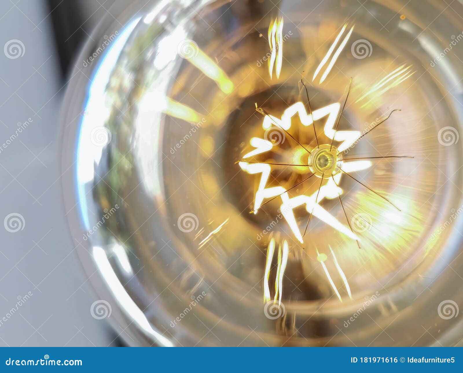 Electricity Current Inside a Retro Crystal Clear Light Bulb. Stock ...