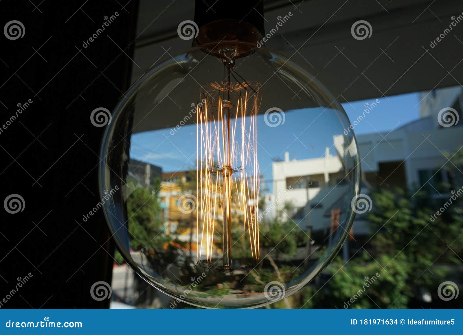 Electricity Current Inside a Retro Crystal Clear Light Bulb. Stock ...