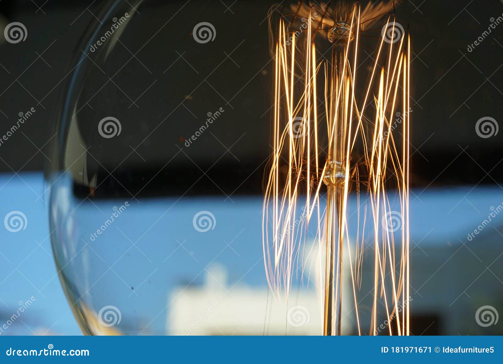 Electricity Current Inside a Retro Crystal Clear Light Bulb. Stock ...