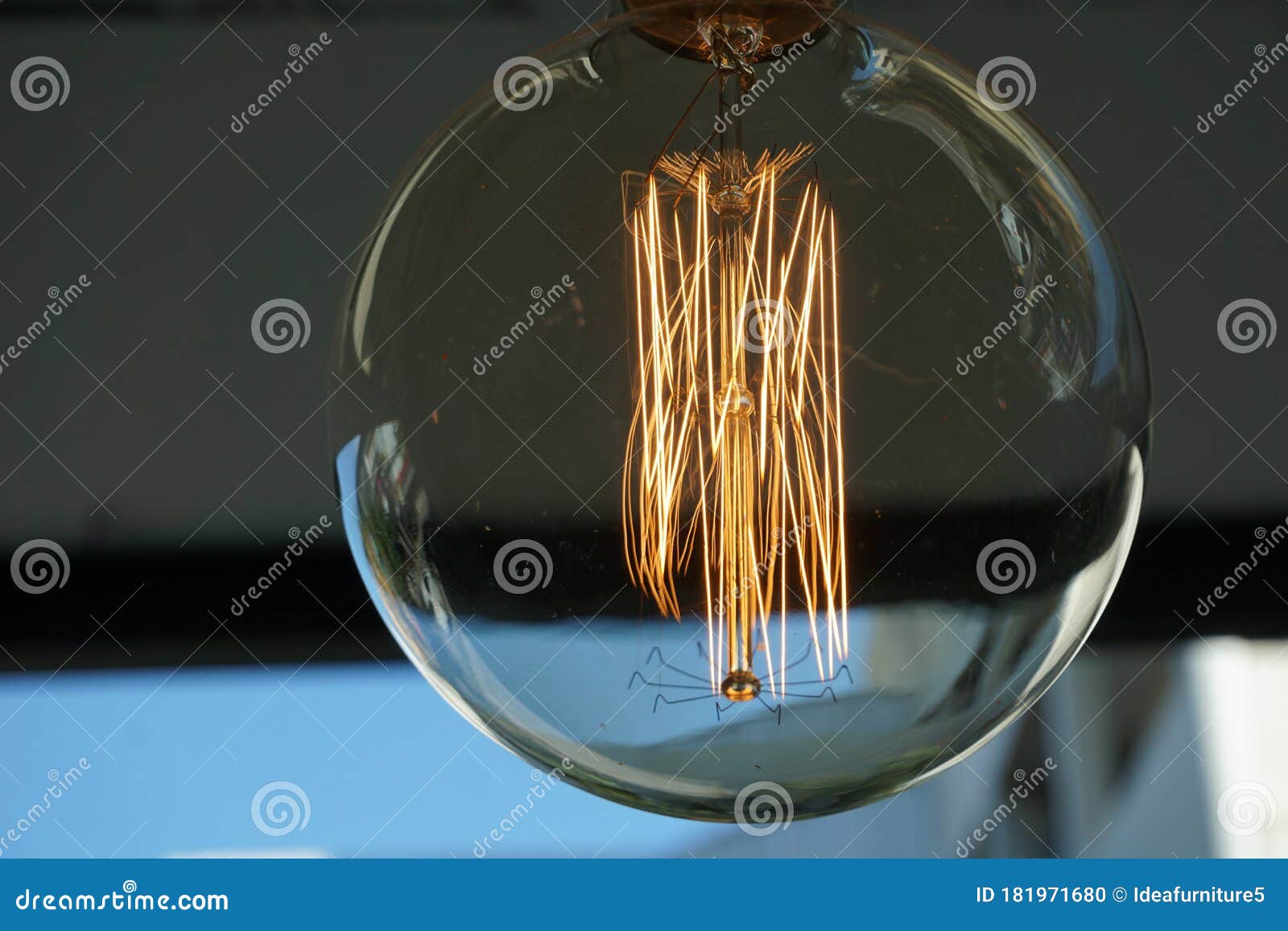 Electricity Current Inside a Retro Crystal Clear Light Bulb. Stock ...