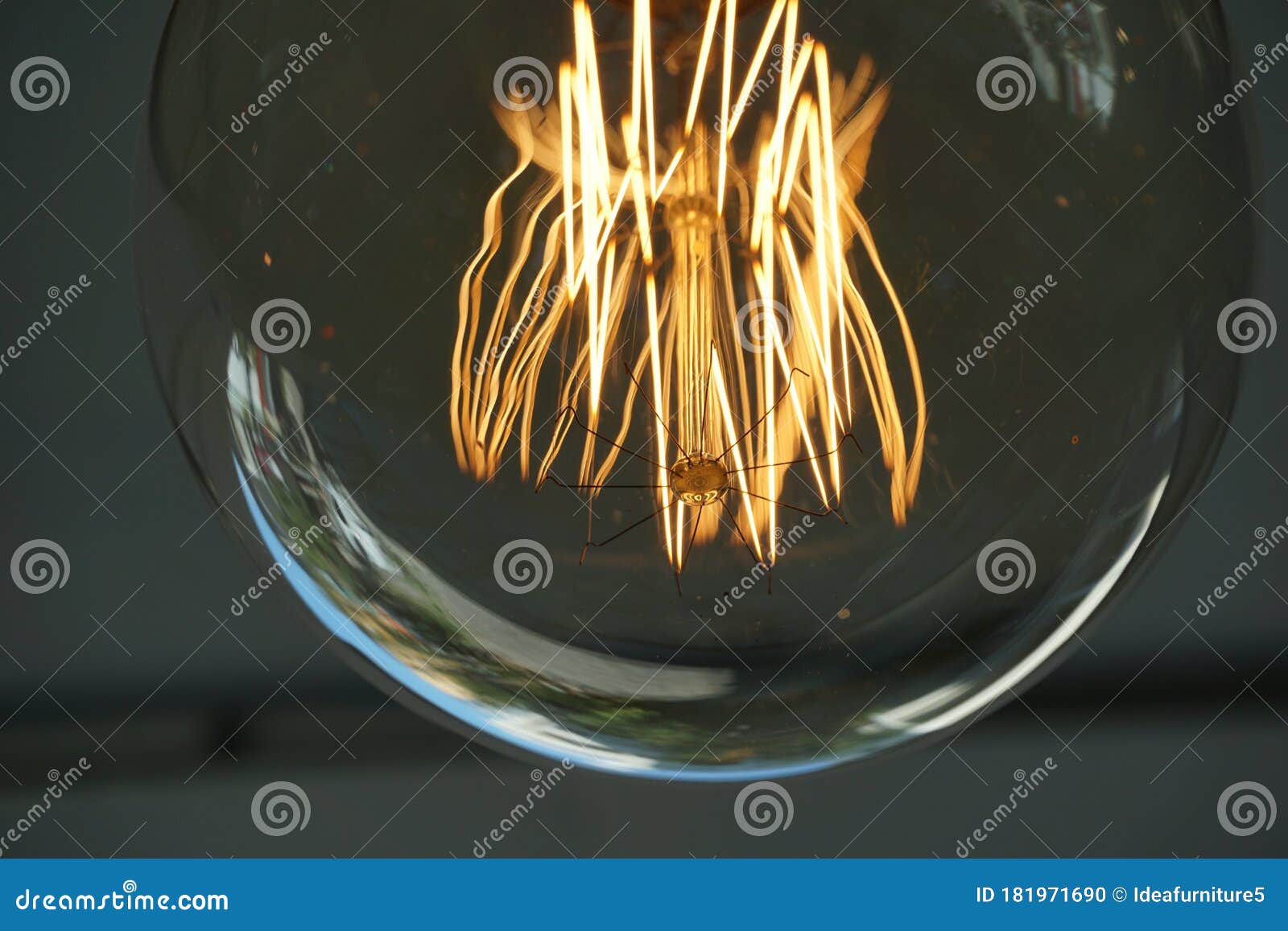 Electricity Current Inside a Retro Crystal Clear Light Bulb. Stock ...