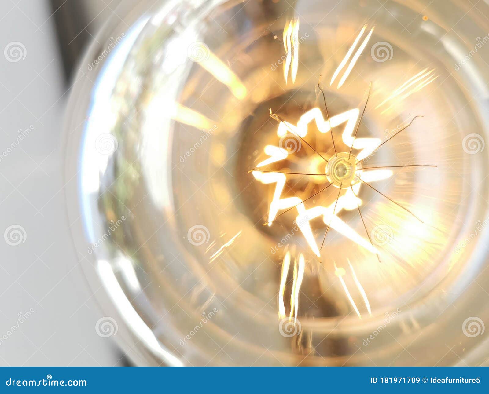 Electricity Current Inside a Retro Crystal Clear Light Bulb. Stock ...