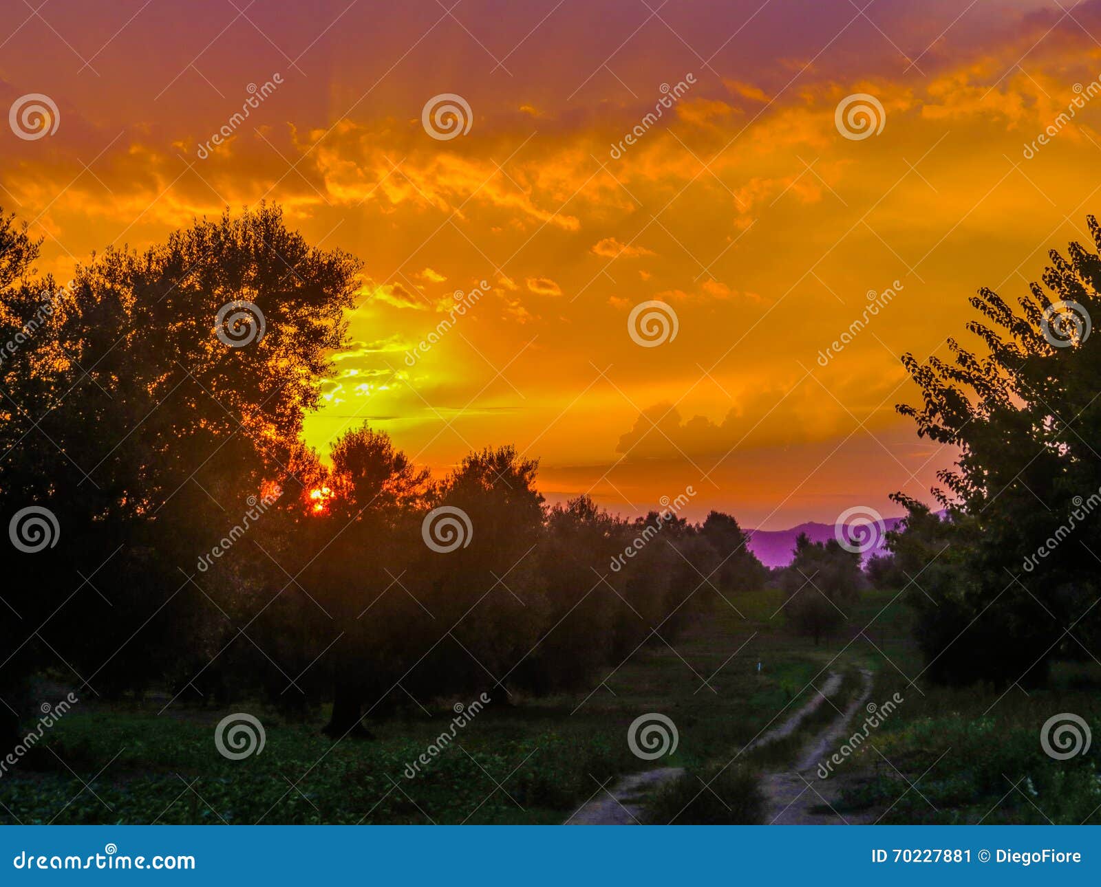 Amazing Italian sunset stock image. Image of perfection - 70227881