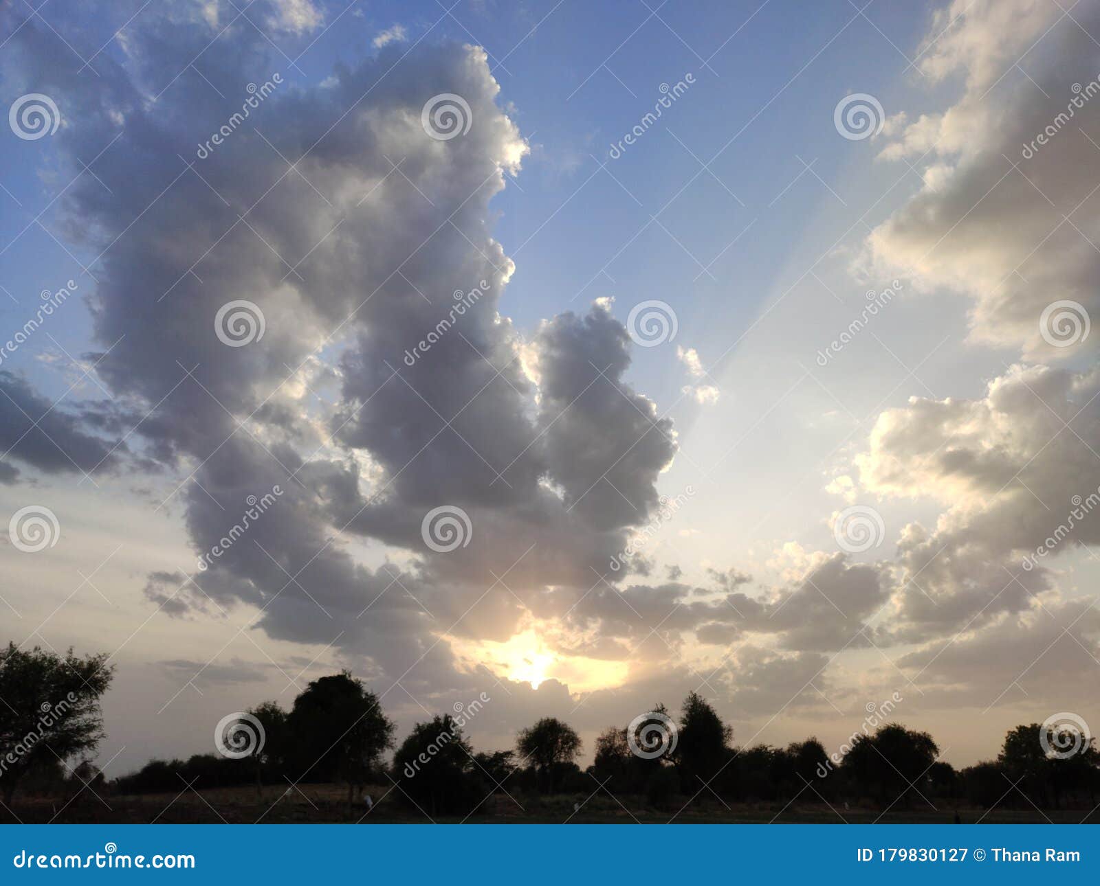 Hidden Sun Behind the Dark Clouds at Evening Time Stock Image - Image ...