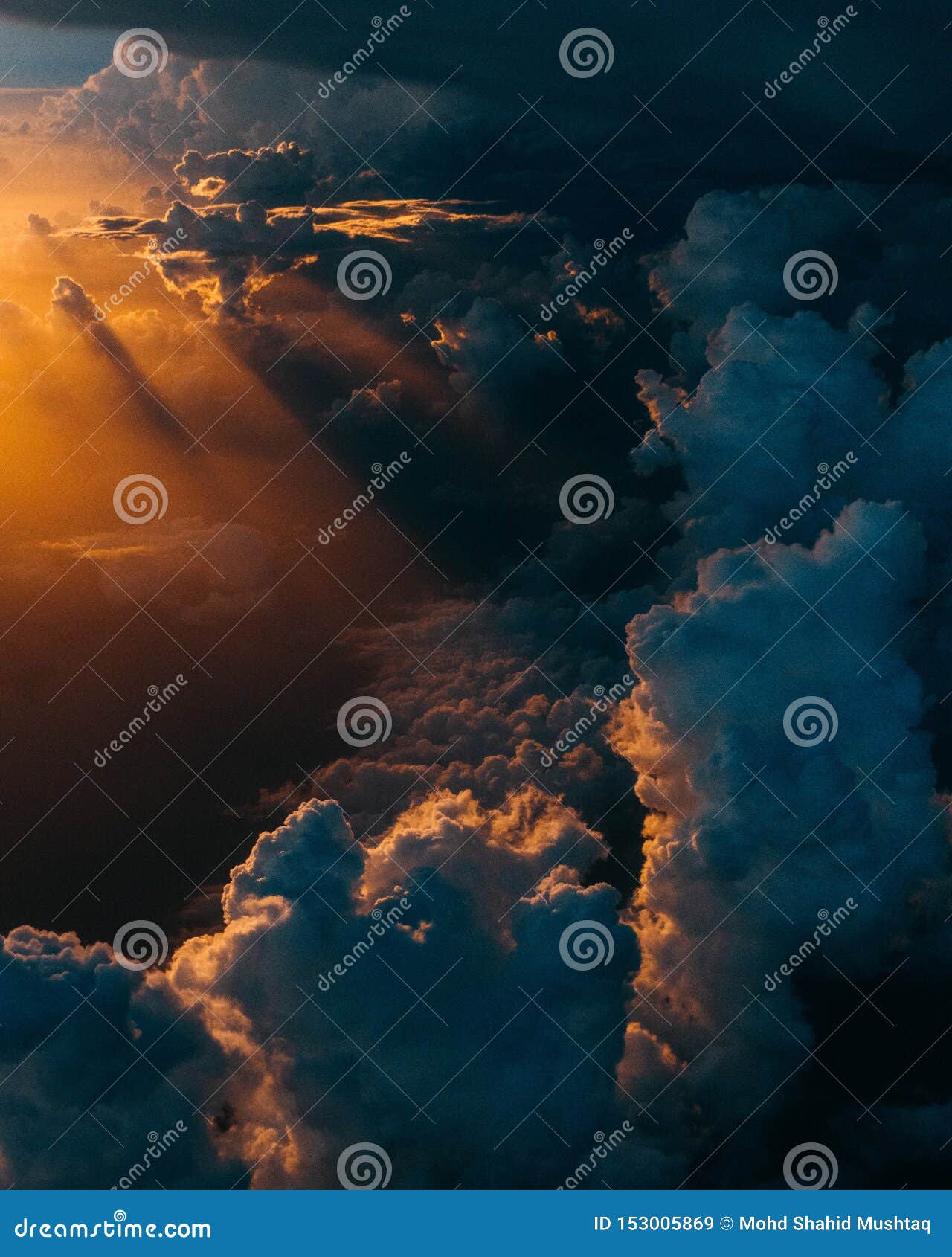 Clouds during golden hour stock image. Image of clouds - 153005869
