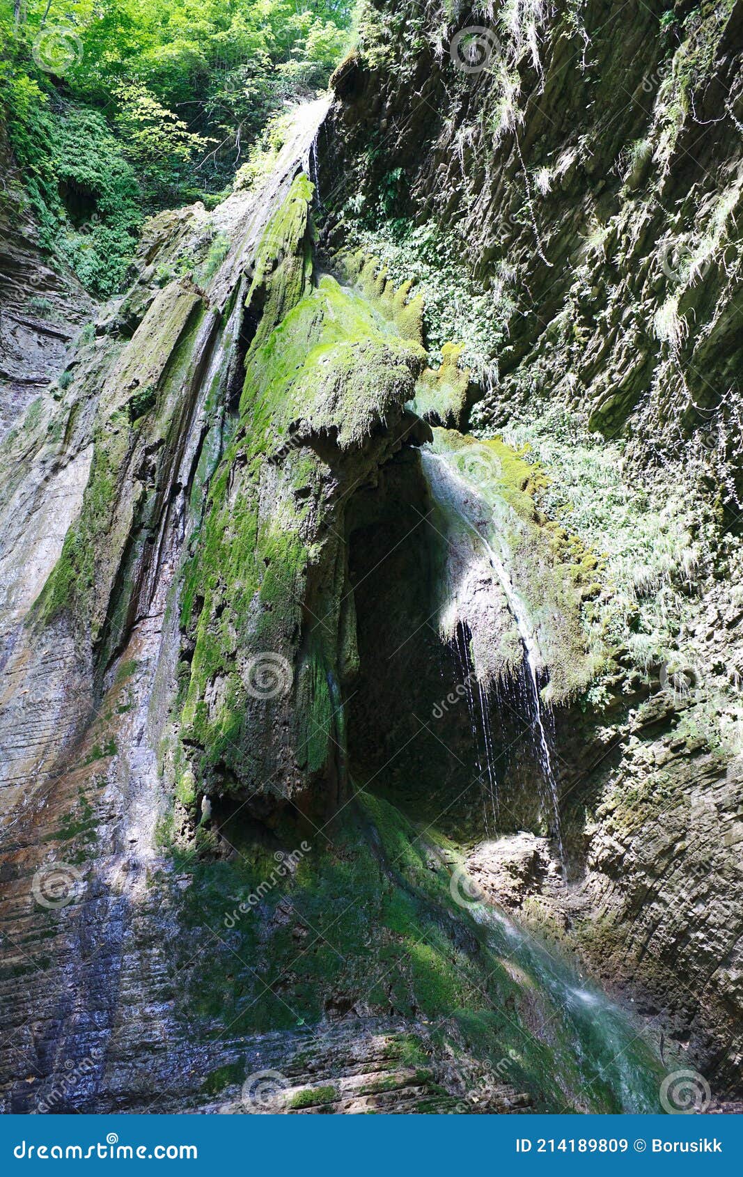 Amazing Waterfall Falling from Rocks Overgrown with Moss Stock Image ...