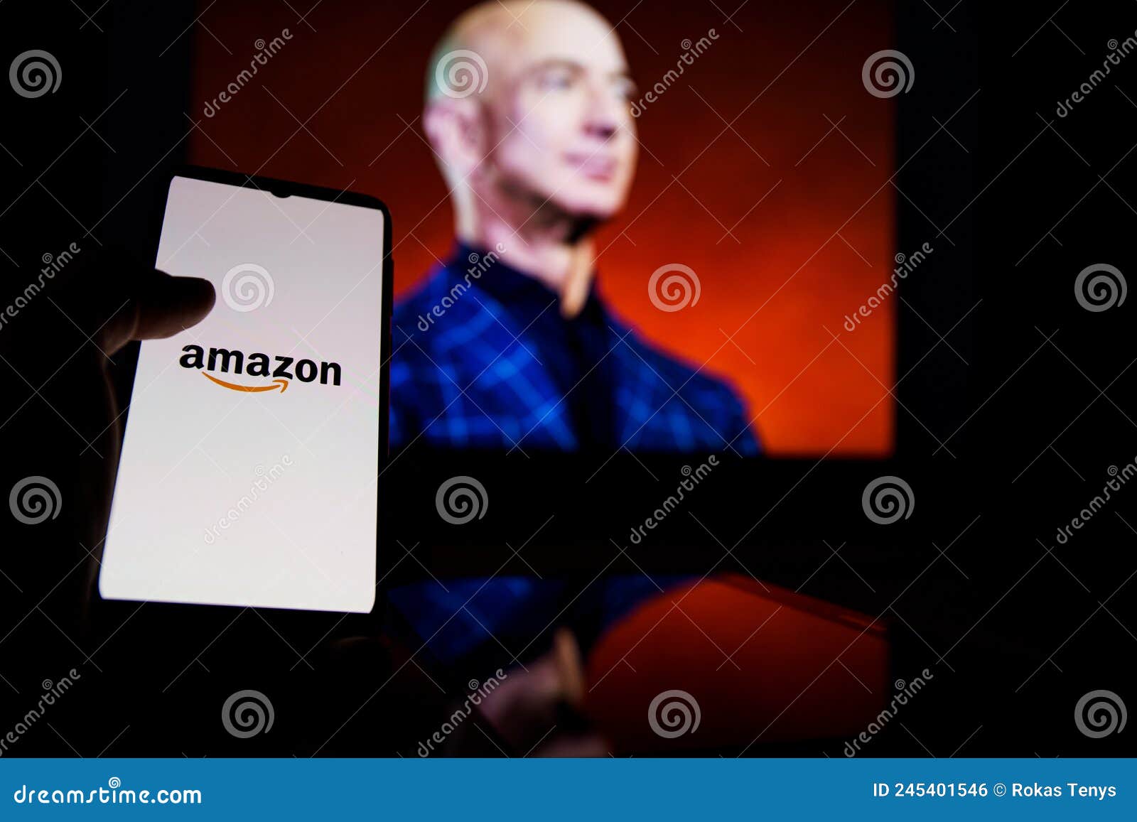 Amazon Logo on Screen and Jeff Bezos is a Executive Chairman of Amazon ... Amazon Logo on Screen and Jeff Bezos is a Executive Chairman of Amazon ...