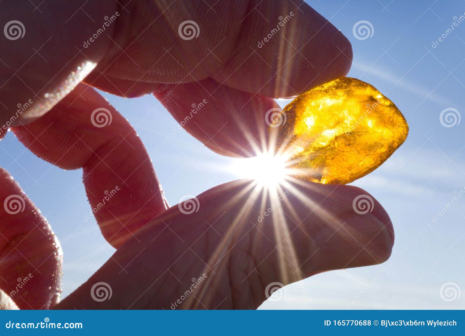 Amber against the sun stock photo. Image of transparent - 165770688