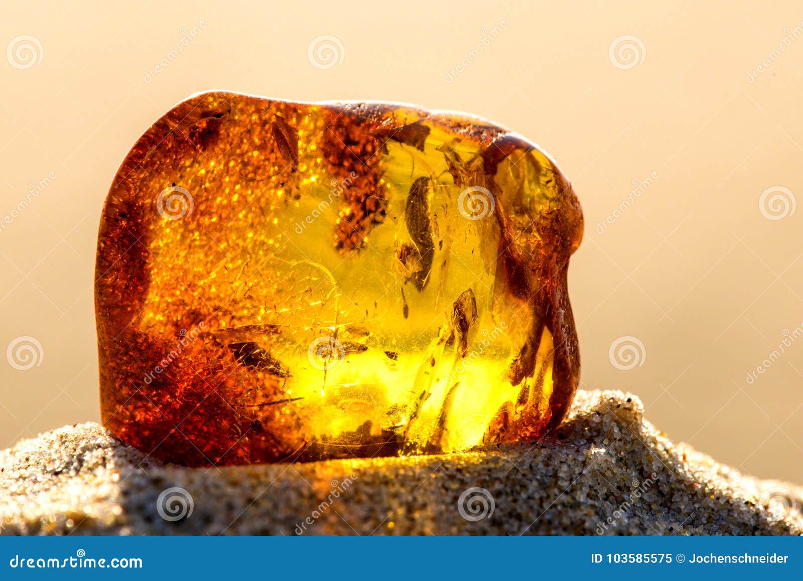 Amber on a beach stock image. Image of closeup, jewelery - 103585575