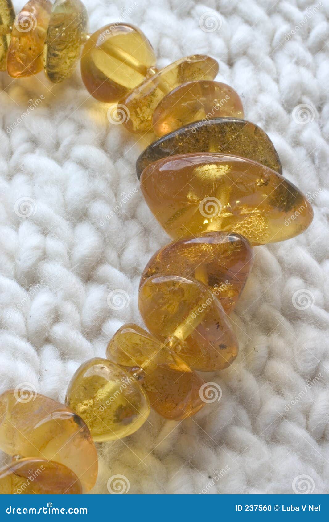 Amber beads string stock photo. Image of adornment, glitters - 237560