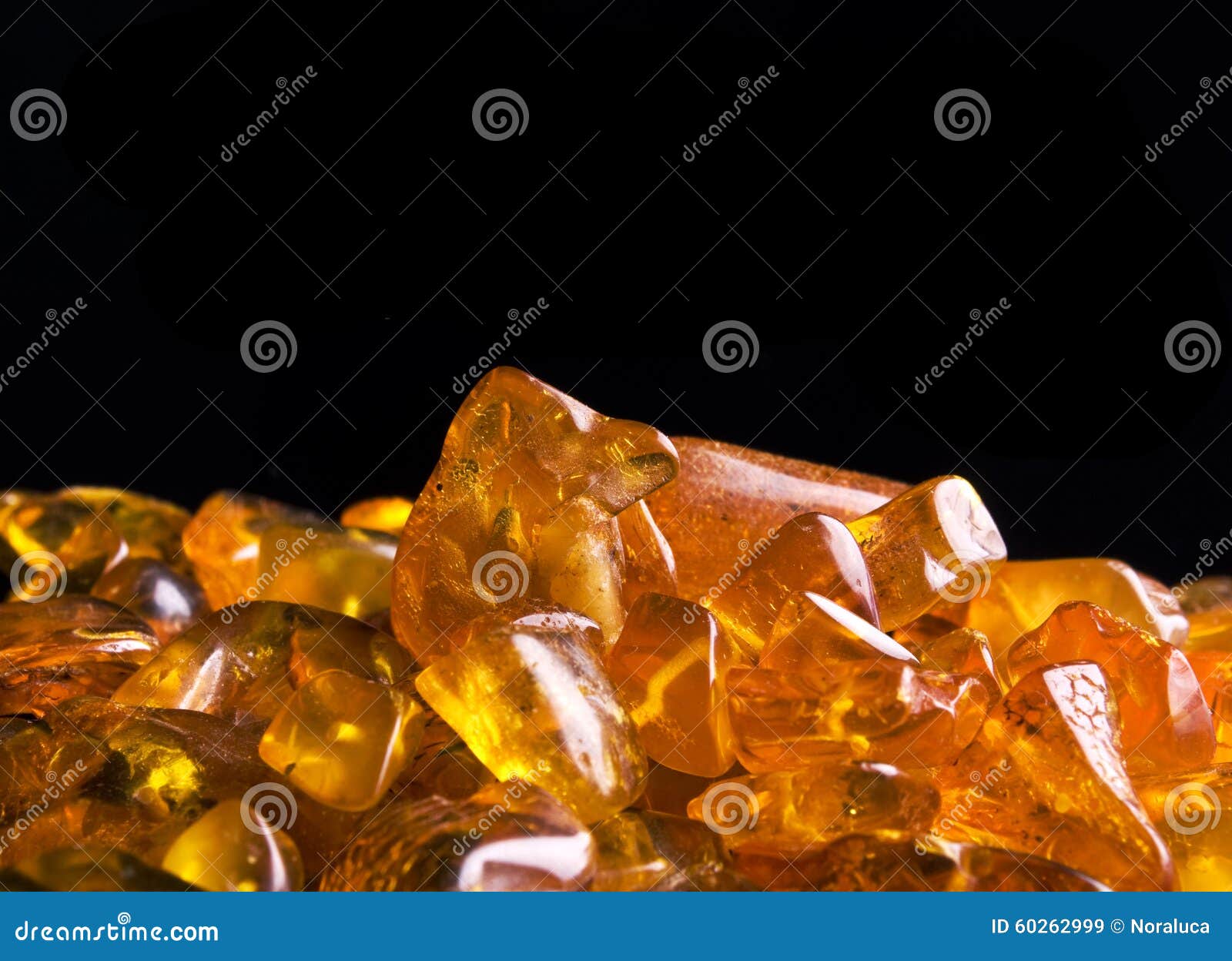 Amber on black stock image. Image of hard, jewelry, jewelery - 60262999