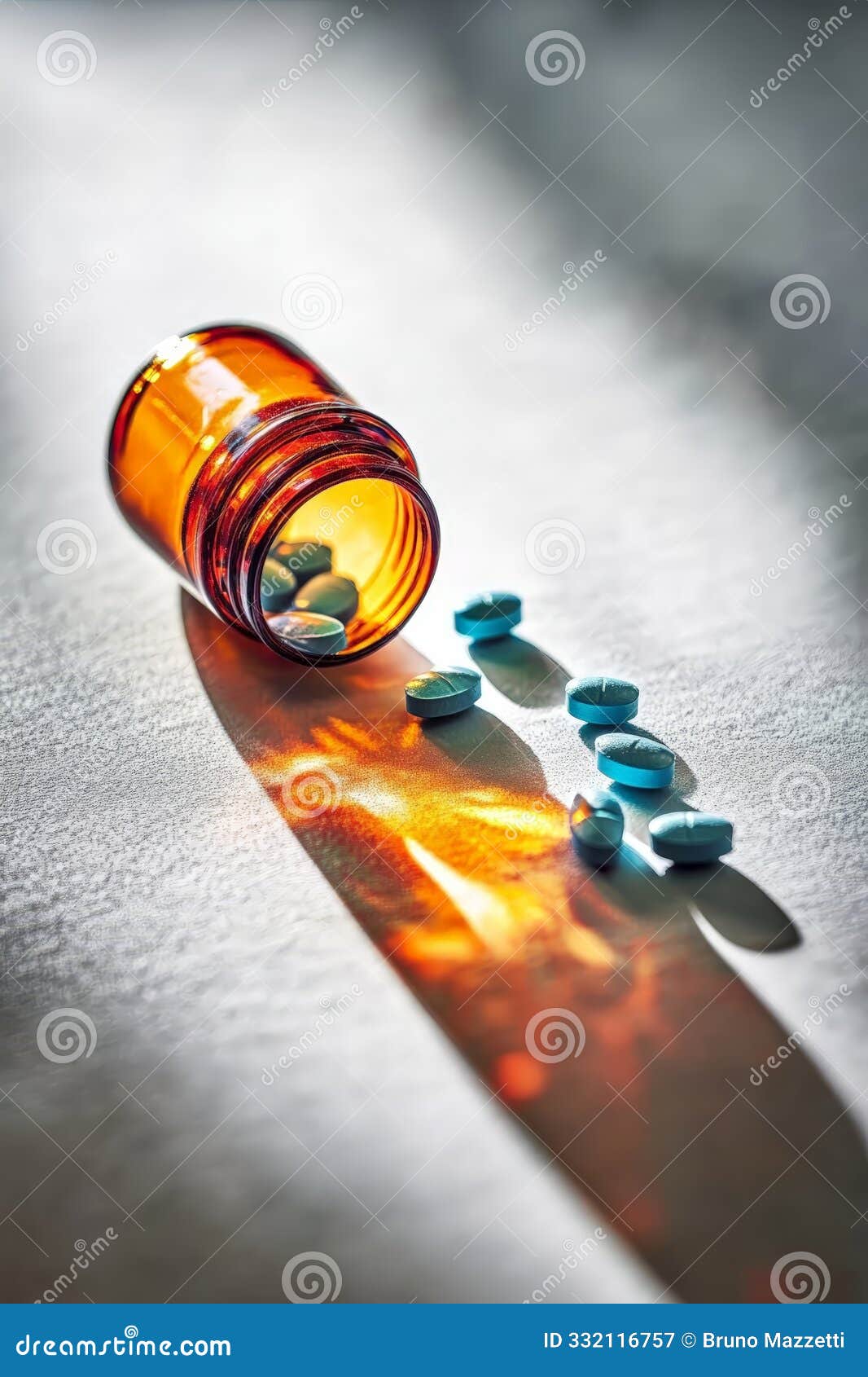 Amber Pill Bottle Tipped Over, Spilling Blue Tablets on a White Surface ...