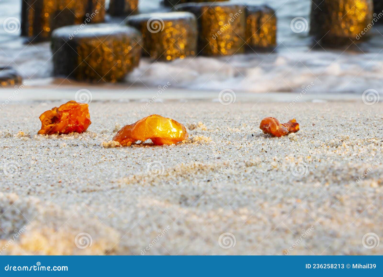 Amber on Fine Sand, Beautiful Piece of Amber from the Sand. Stock Image ...