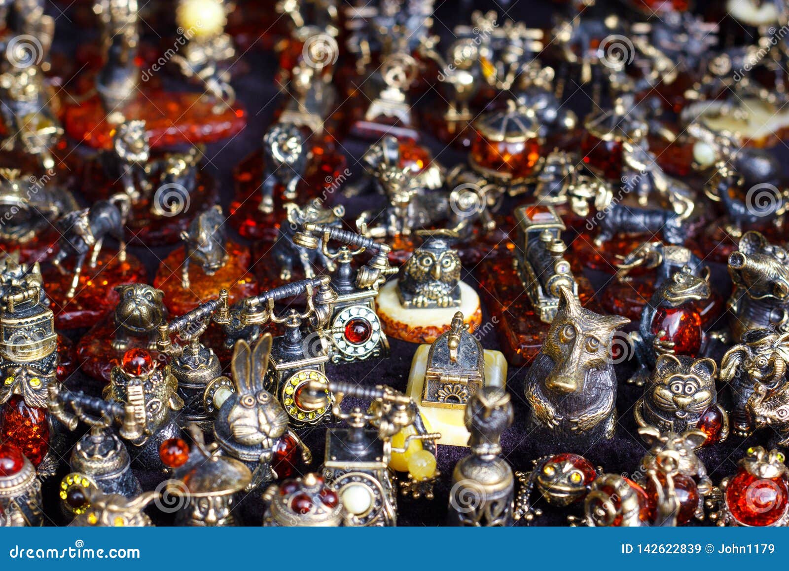 Amber metal figures stock image. Image of metal, travel - 142622839