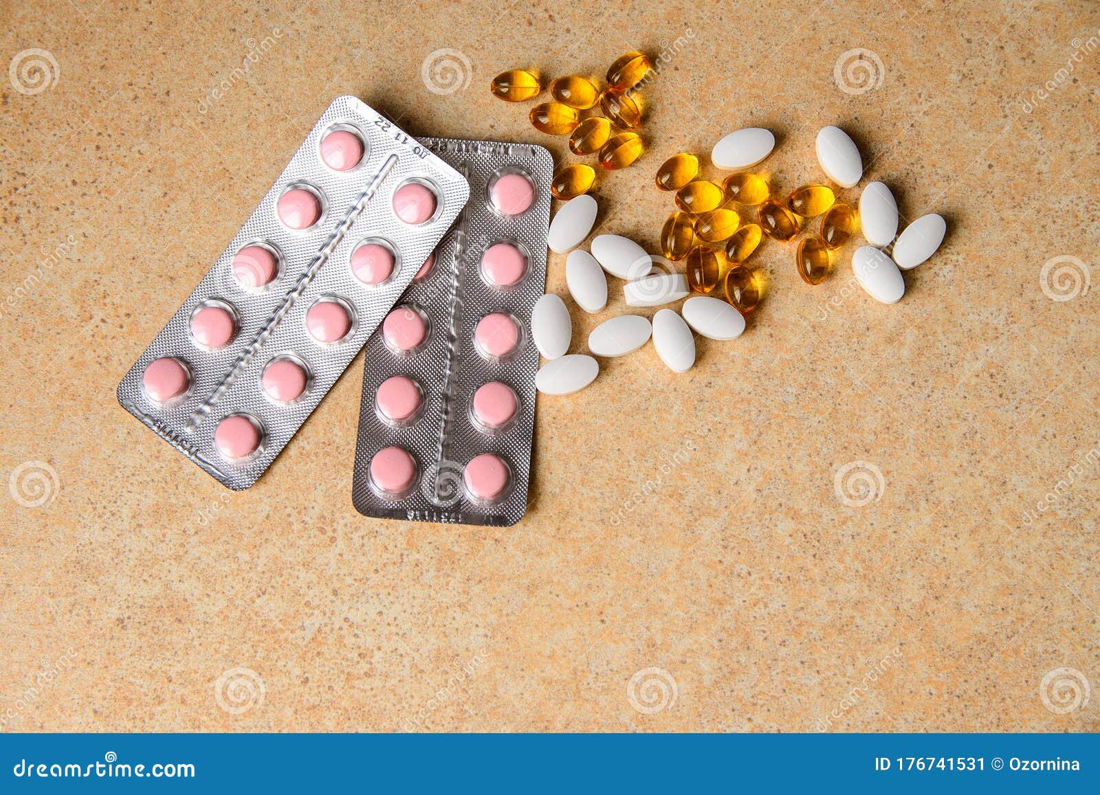 Capsules on a Table with a Pattern of Sand Stock Image - Image of ...