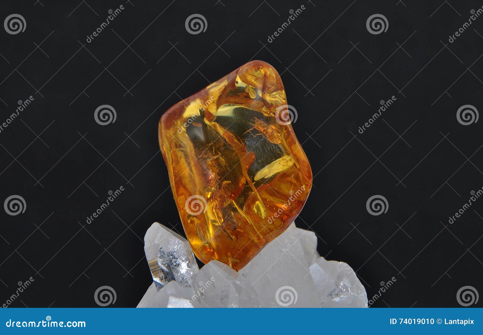 Amber on rock crystal stock photo. Image of mountain - 74019010