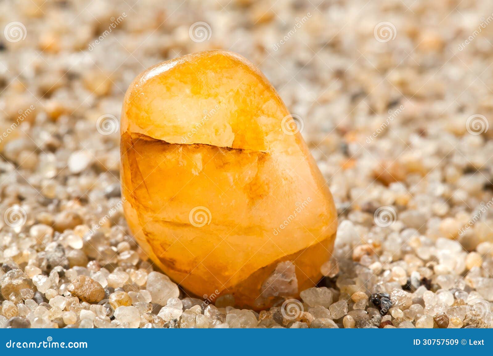 Amber on sand stock image. Image of precious, beach, resin - 30757509