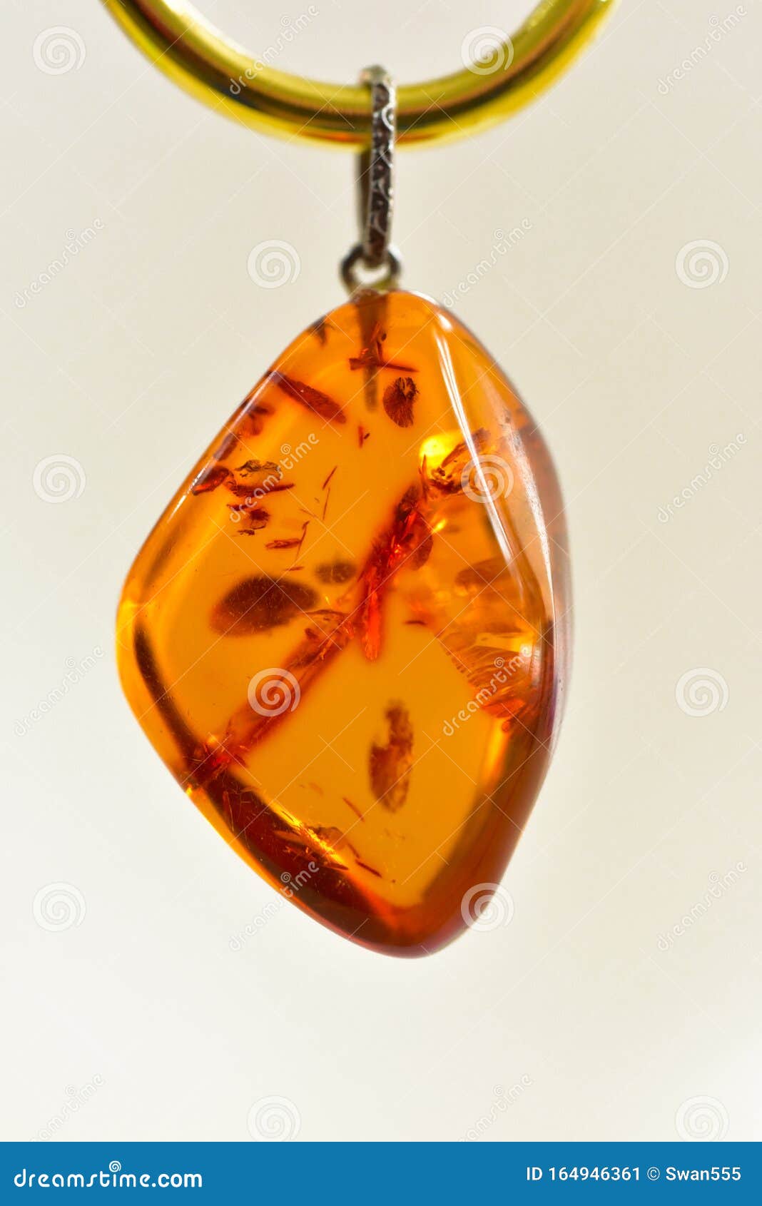 Amber stone pendant stock image. Image of large, jewelry - 164946361