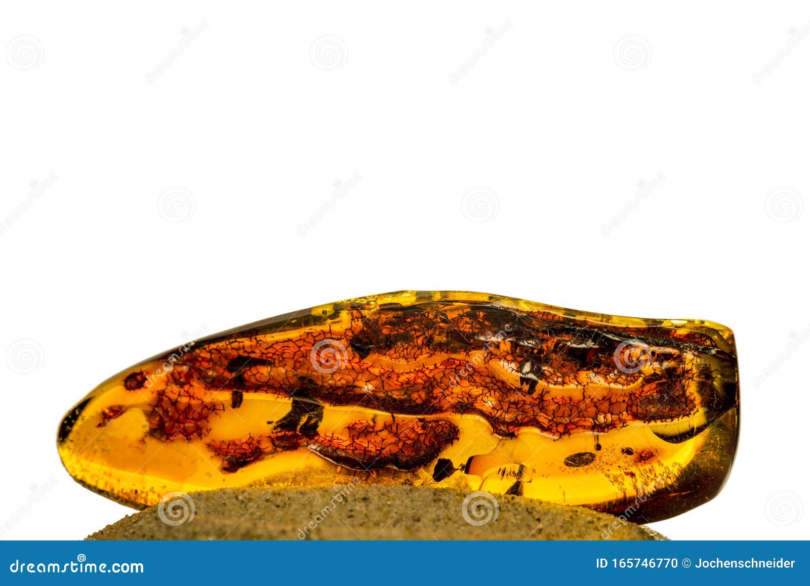 Amber in Sun with Inclusions Stock Photo - Image of alternative, color ...