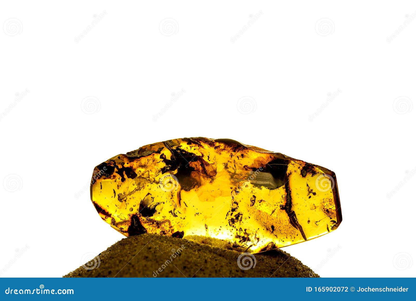 Amber in Sun with Inclusions Stock Photo - Image of biology, healing ...