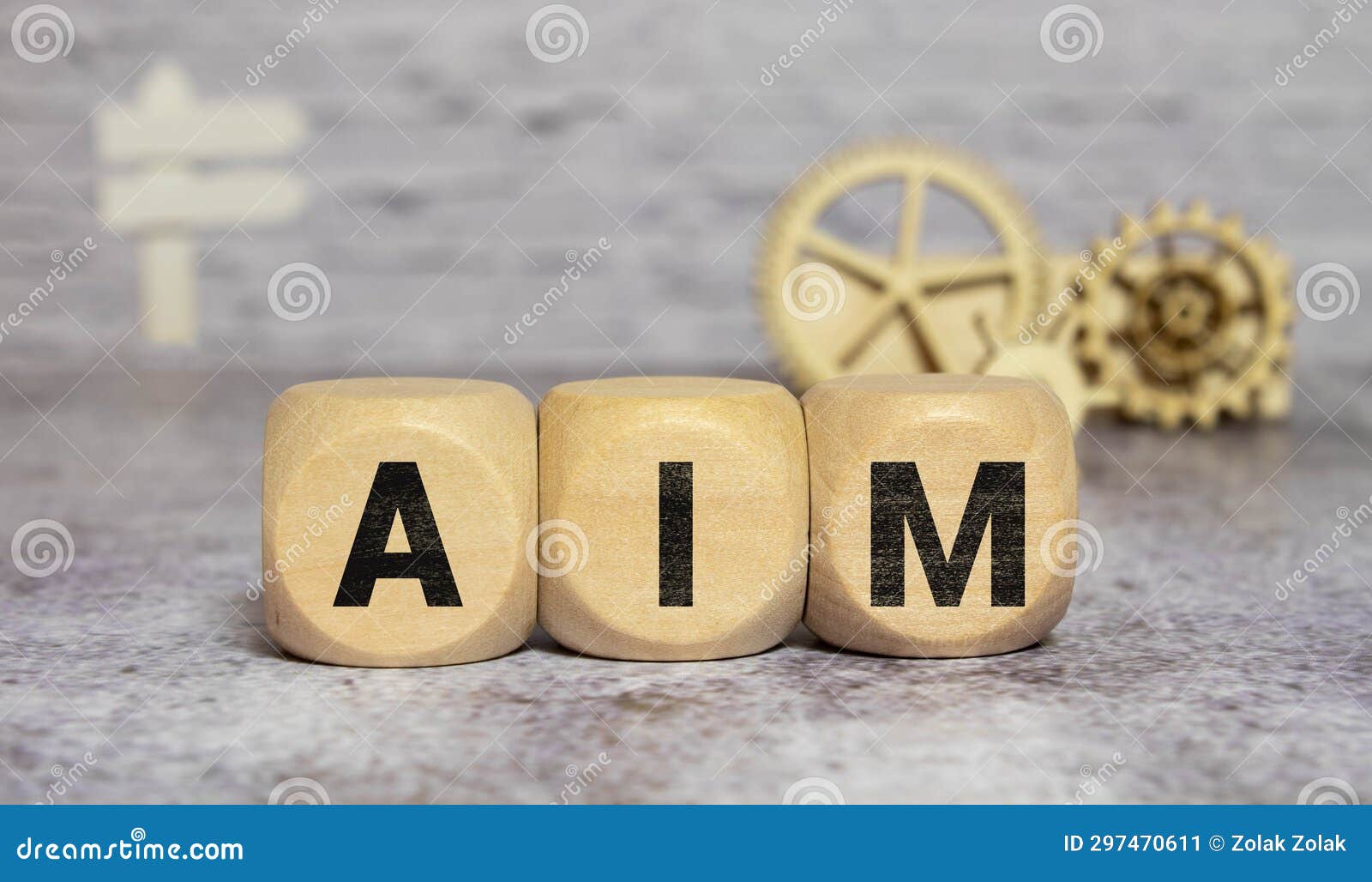 Ambition, Mission and Objective Concept. Wooden Cubes with Text AIM and Archery Target with ...