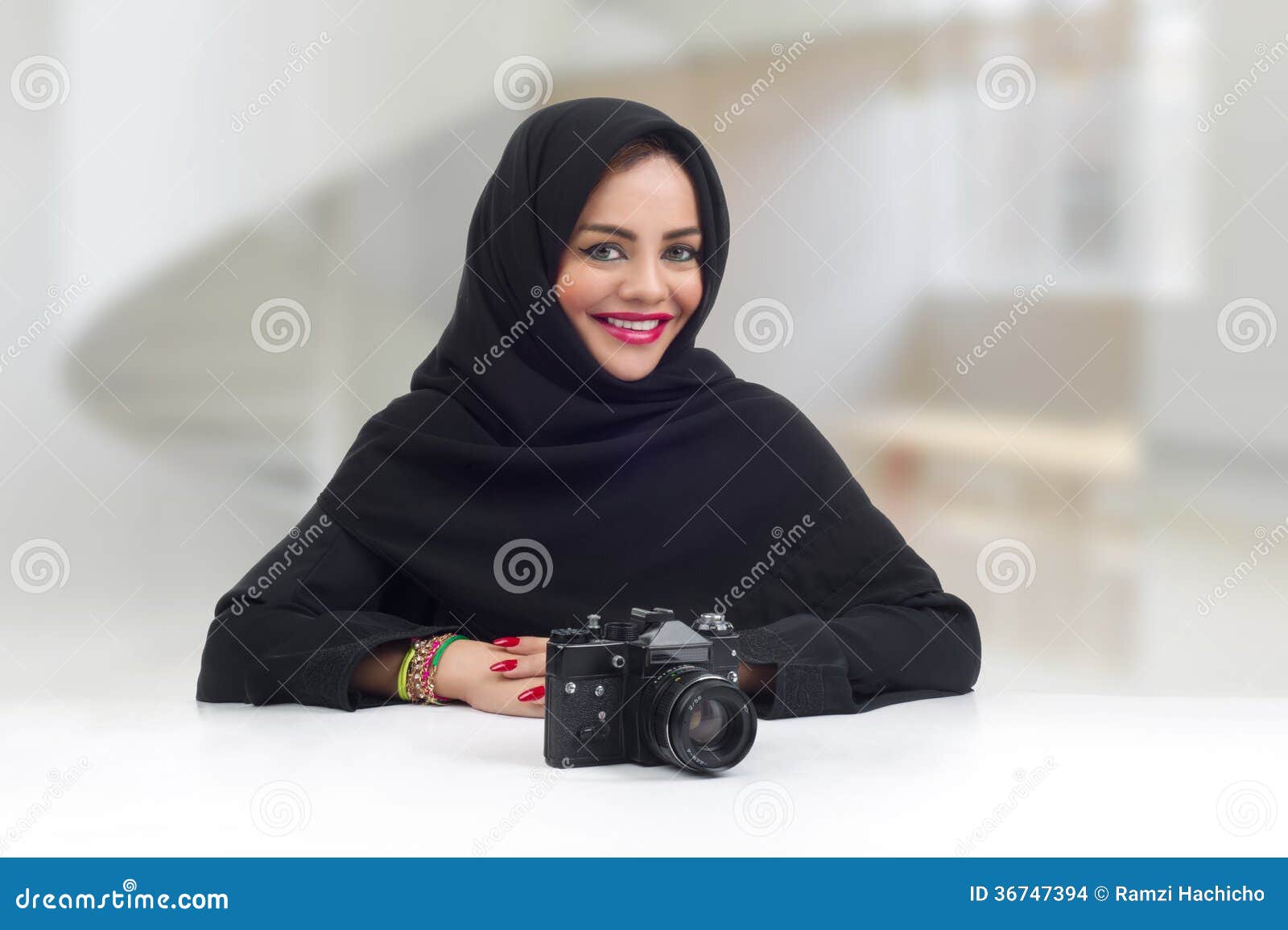 Ambitious Arabian Photographer Posing with Her Professional Camera ...