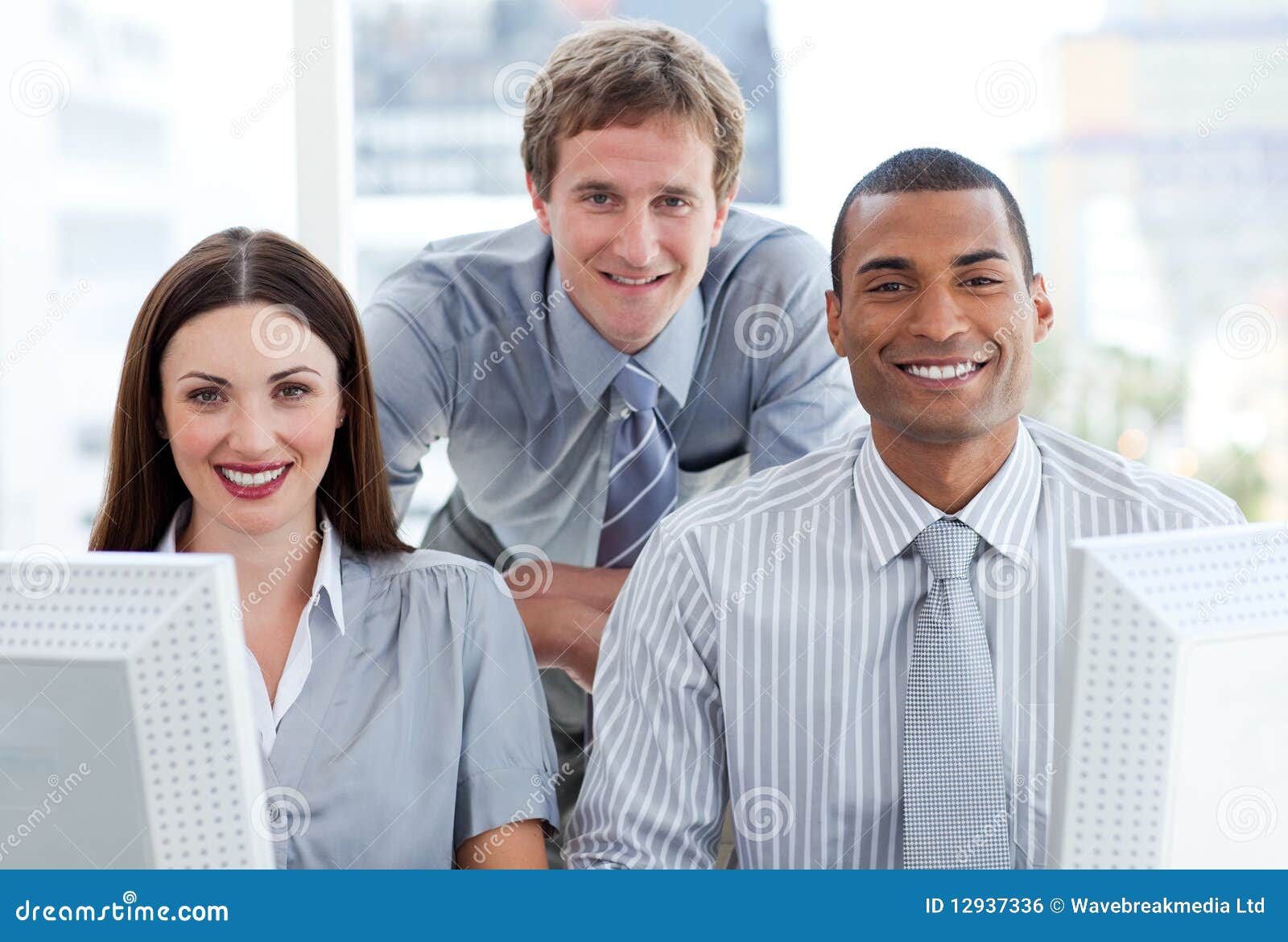Ambitious Business Group Working at a Computer Stock Photo - Image of ...