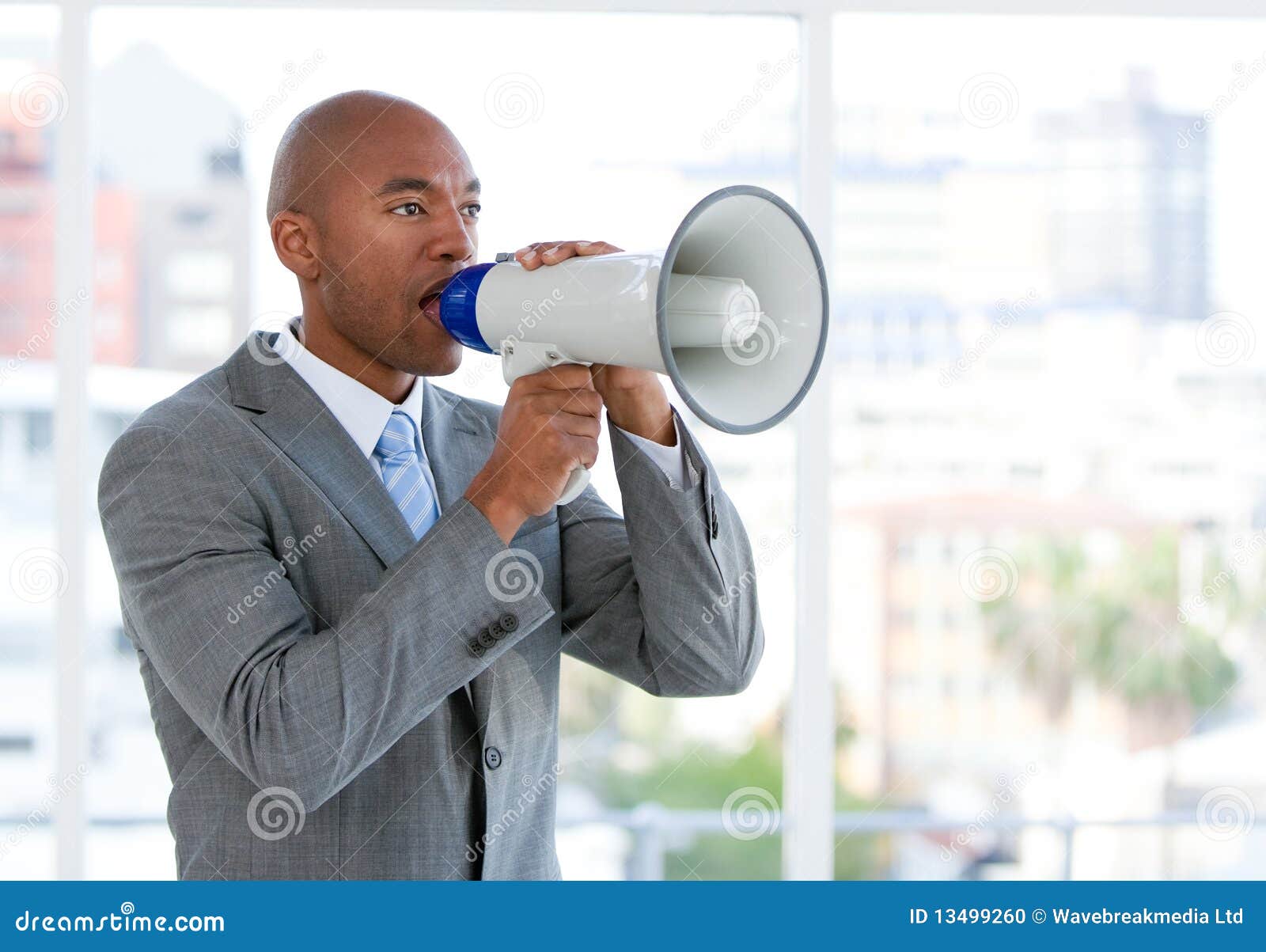 Ambitious Businessman Yelling through a Megaphone Stock Photo - Image ...
