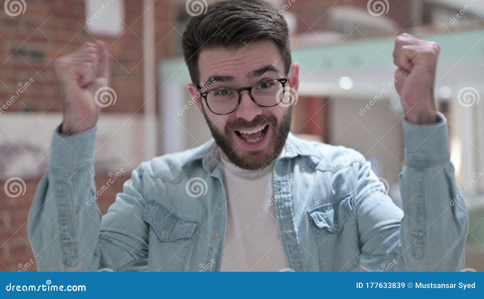 Ambitious Young Man in Glasses Celebrating Success Stock Image - Image ...