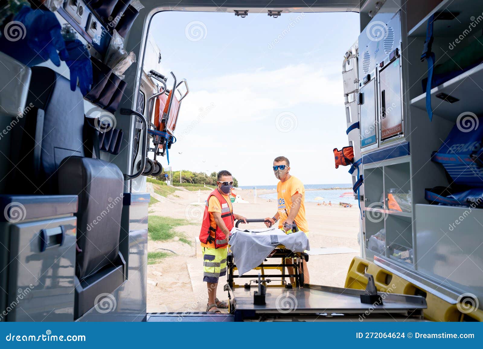 Ambulance and a Team of First Aid Workers Stock Photo - Image of ...