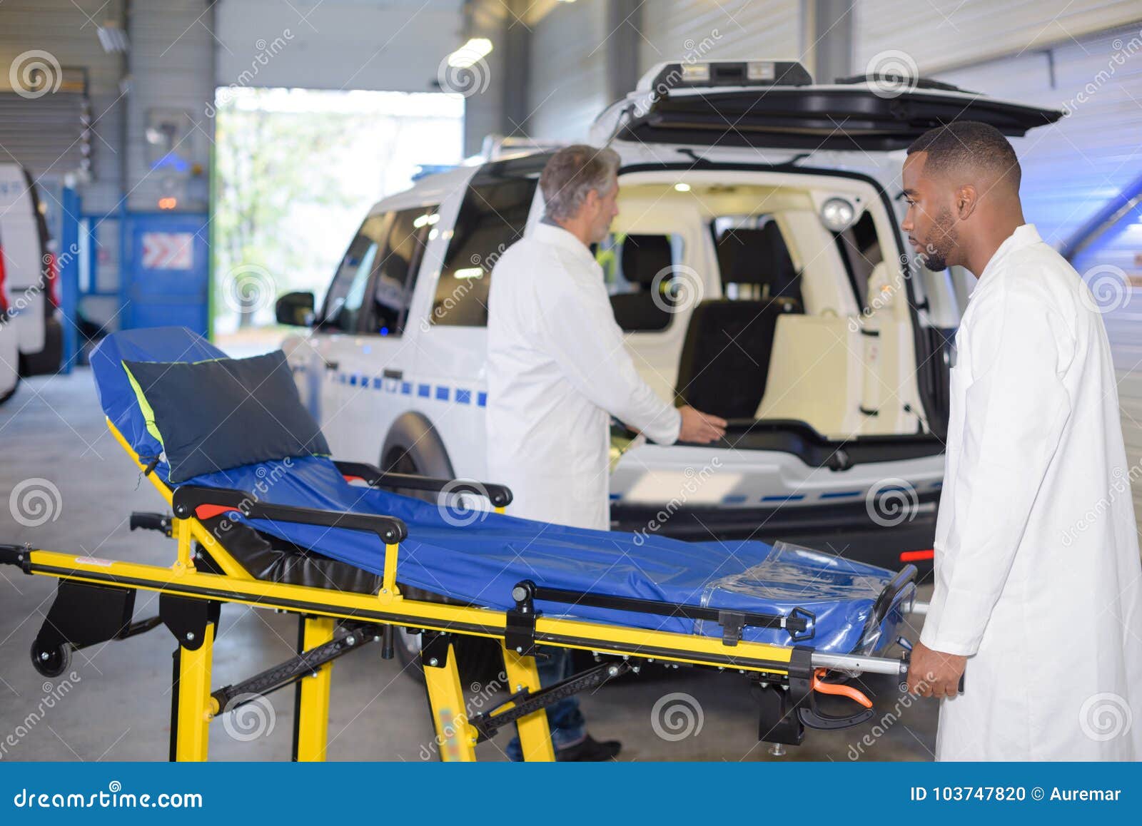 Ambulance Team Preparing Vehicle Stock Photo - Image of help ...